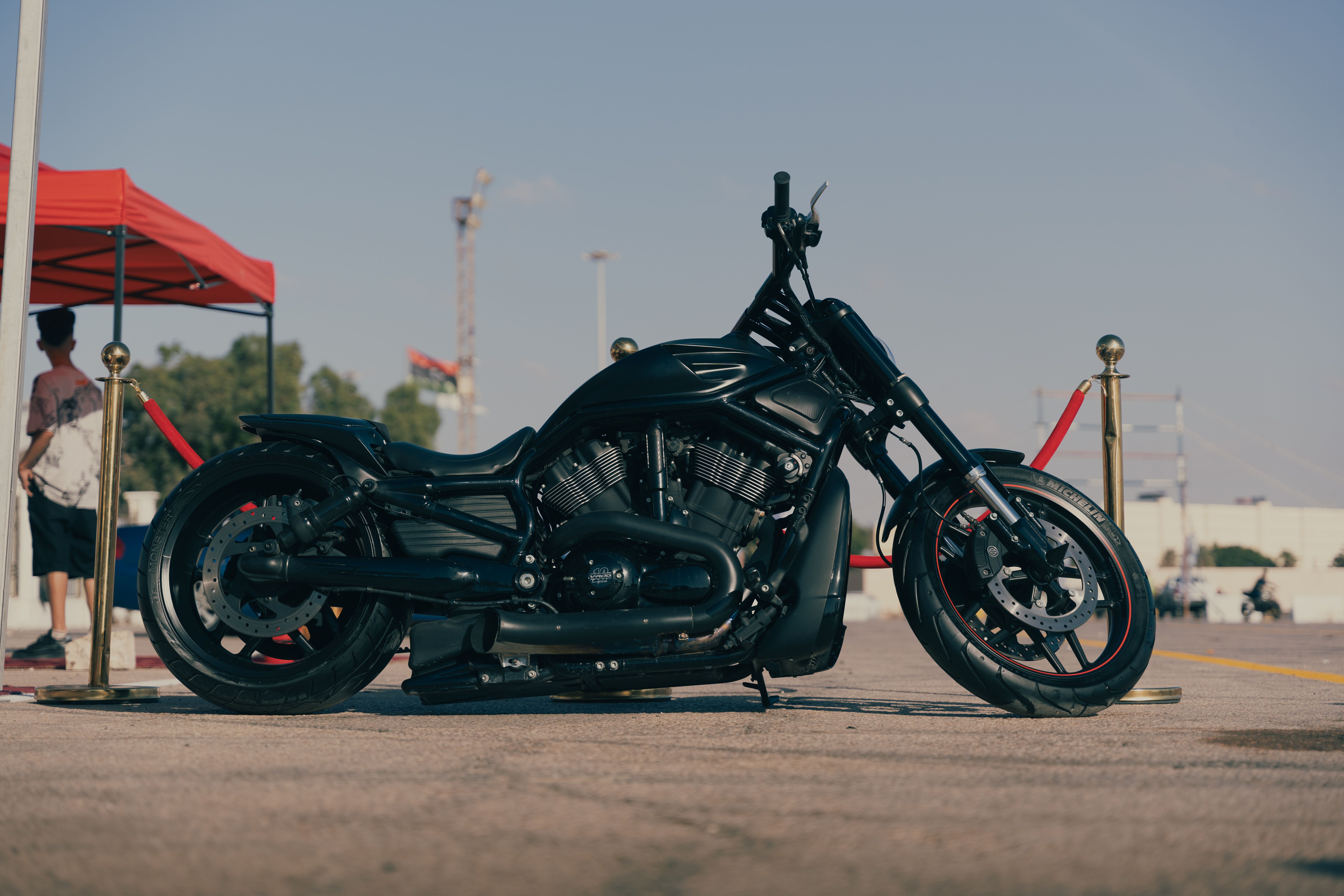 Sleek Black Motorcycle at Outdoor Event in Benghazi · Free Stock Photo