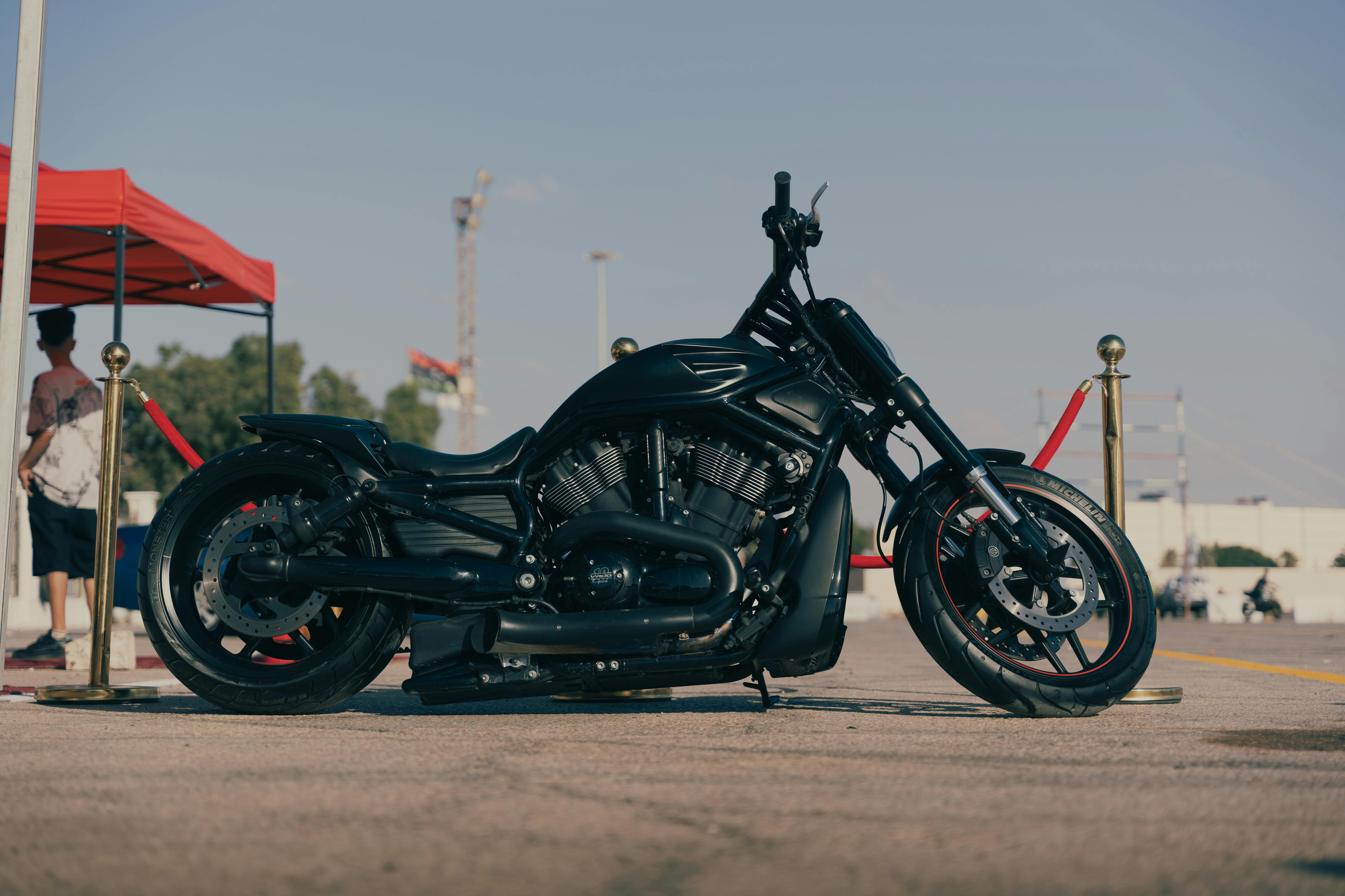 Sleek Black Motorcycle at Outdoor Event in Benghazi · Free Stock Photo