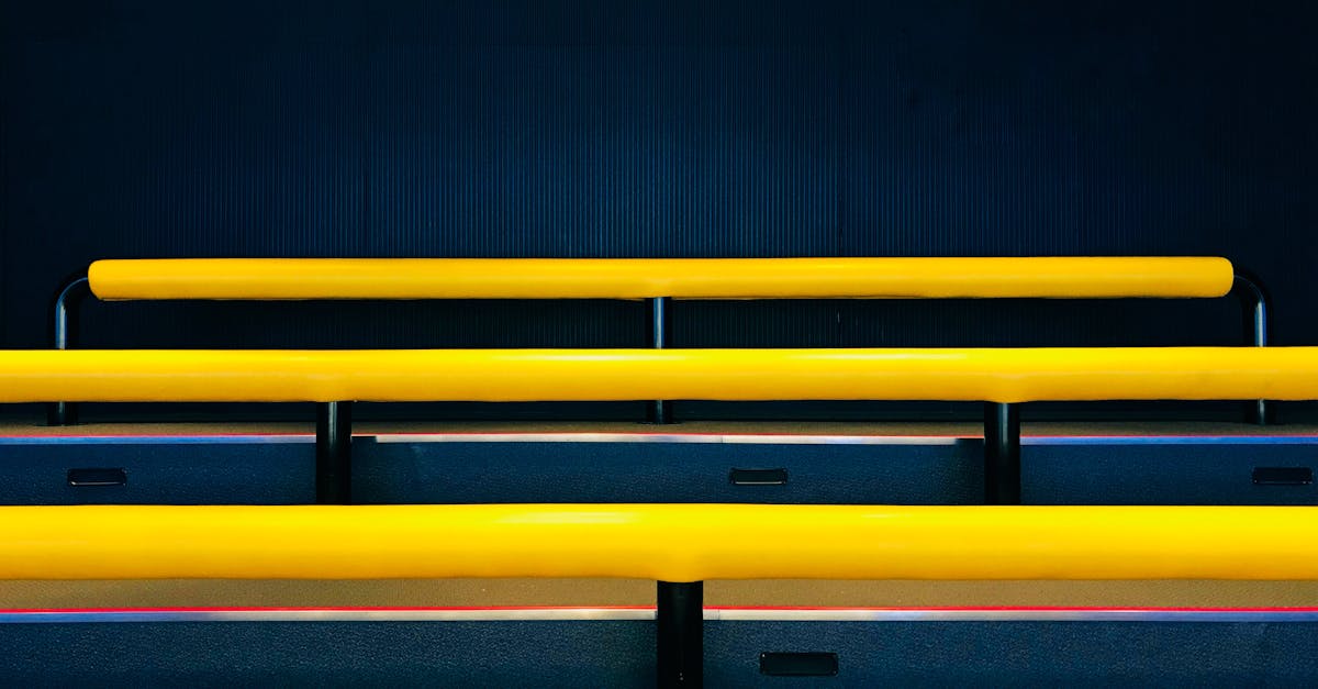 Bright Yellow Rails in Industrial Setting · Free Stock Photo Bright Yellow Rails in Industrial Setting · Free Stock Photo