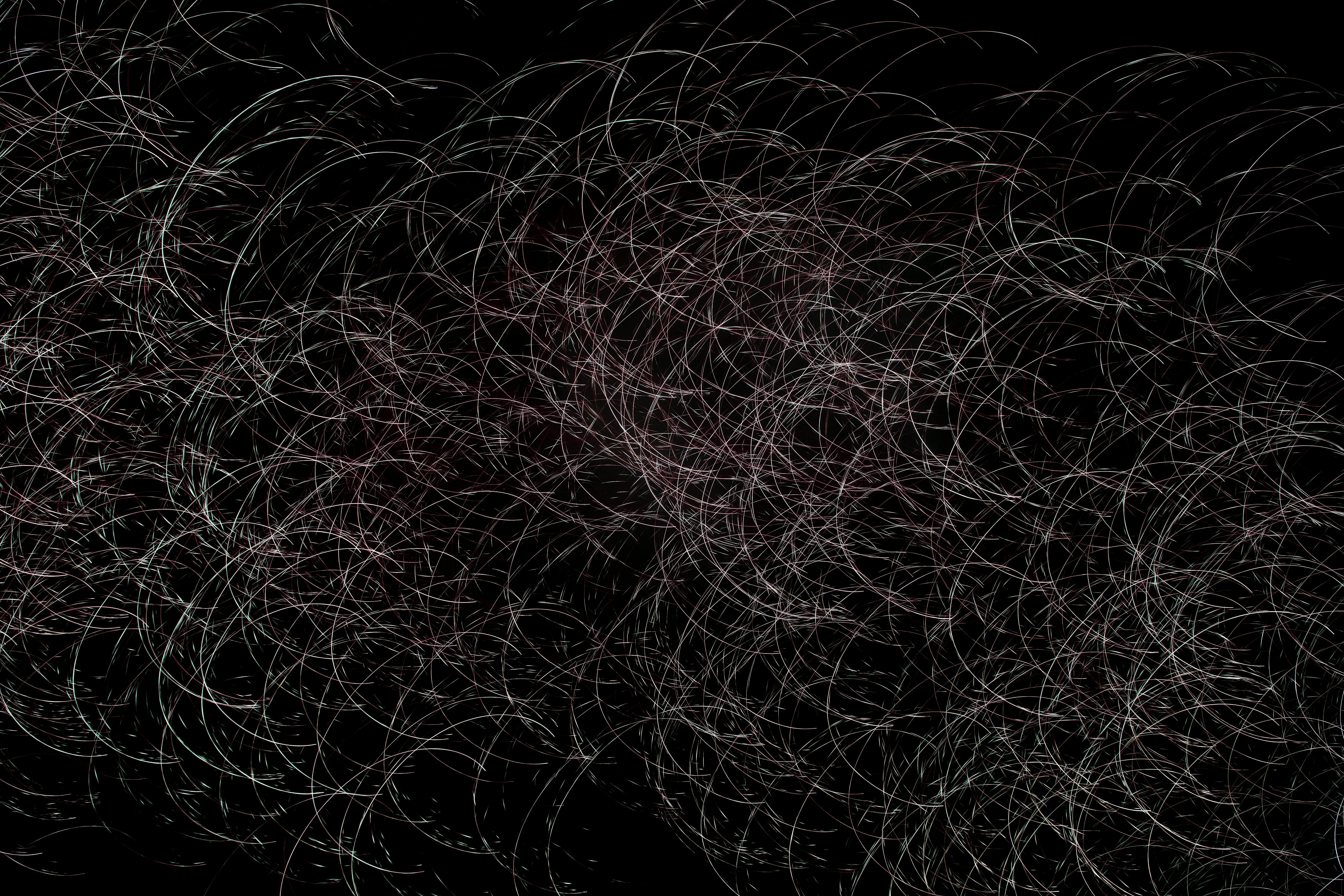 Abstract Circular Light Trails on Black Background · Free Stock Photo