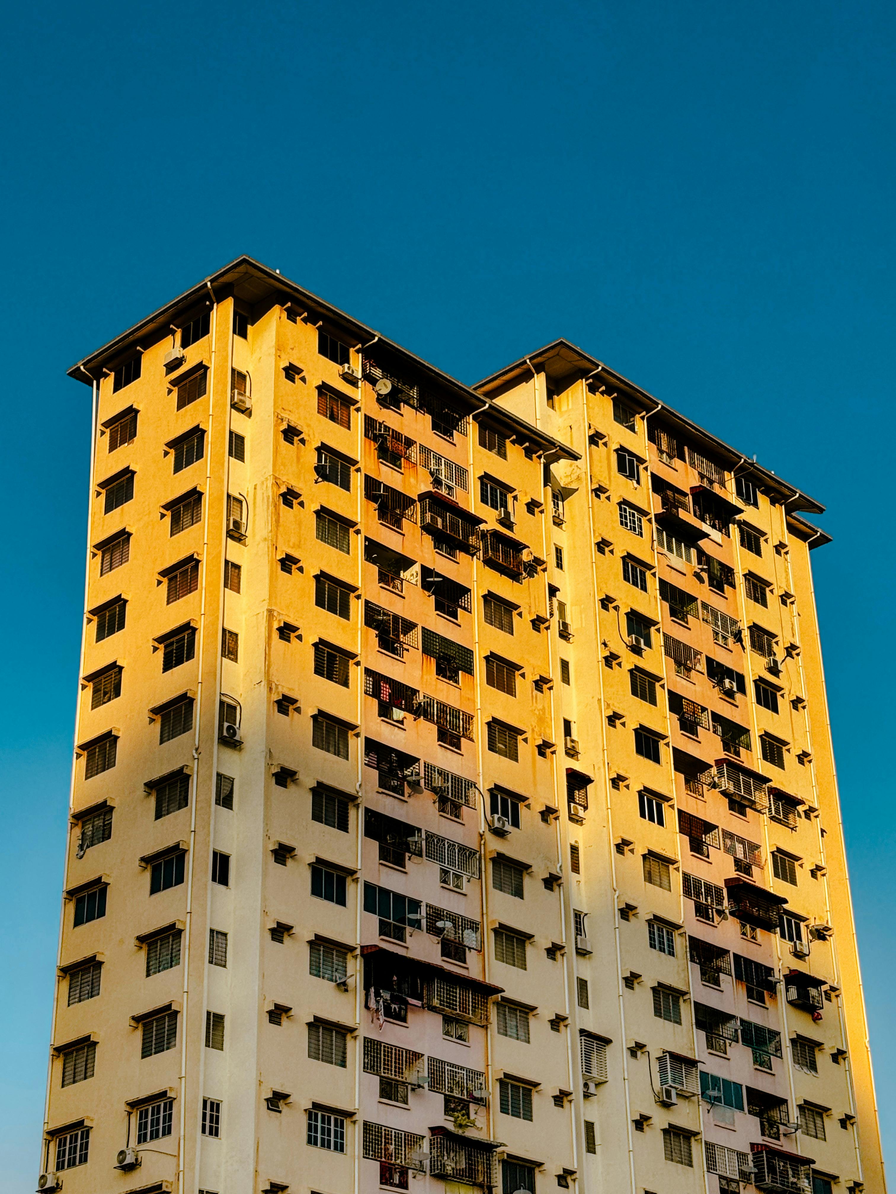 High-rise Building against Clear Blue Sky in Kuala Lumpur · Free Stock ...