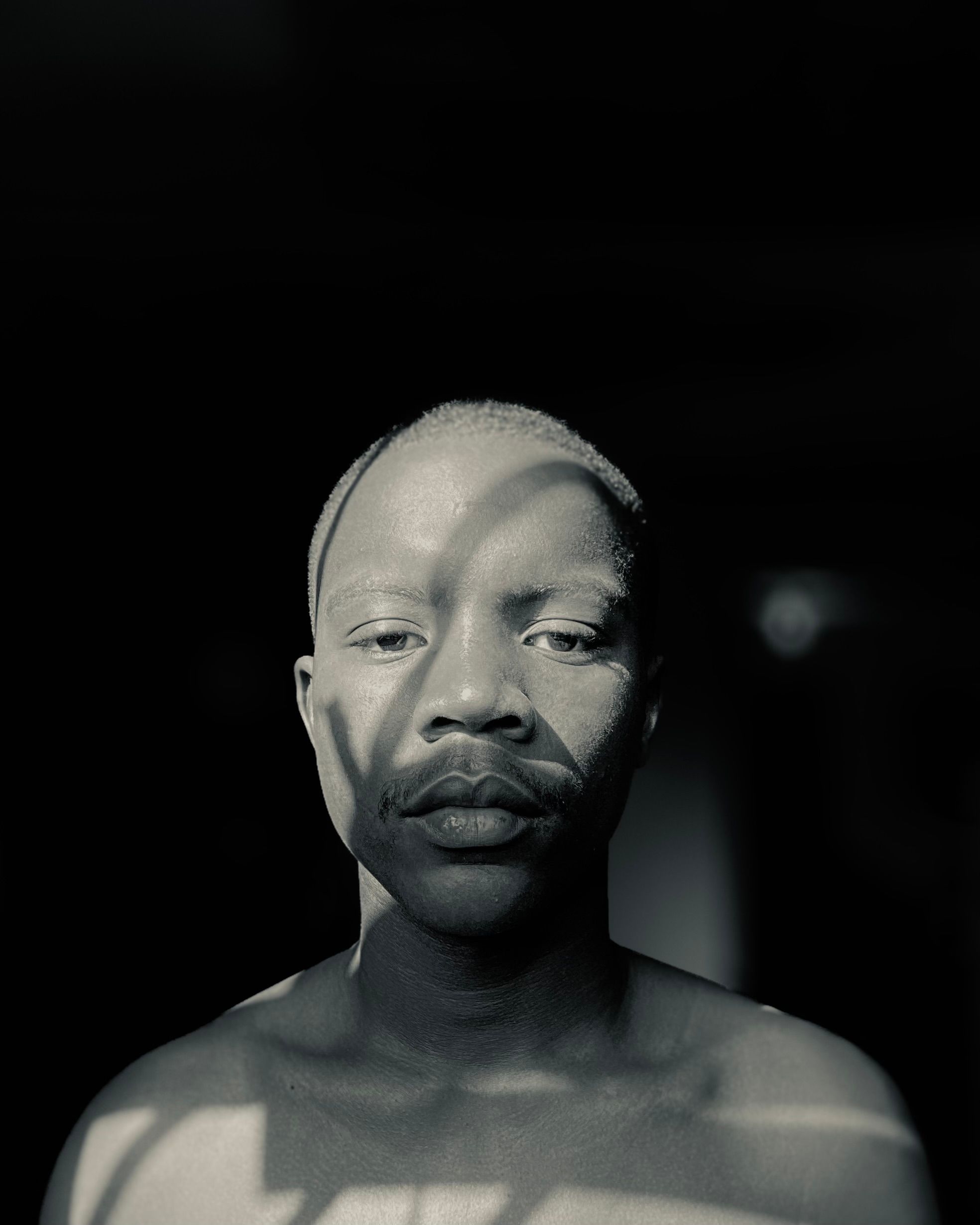 Artistic Portrait with Dramatic Shadows in Cape Town · Free Stock Photo