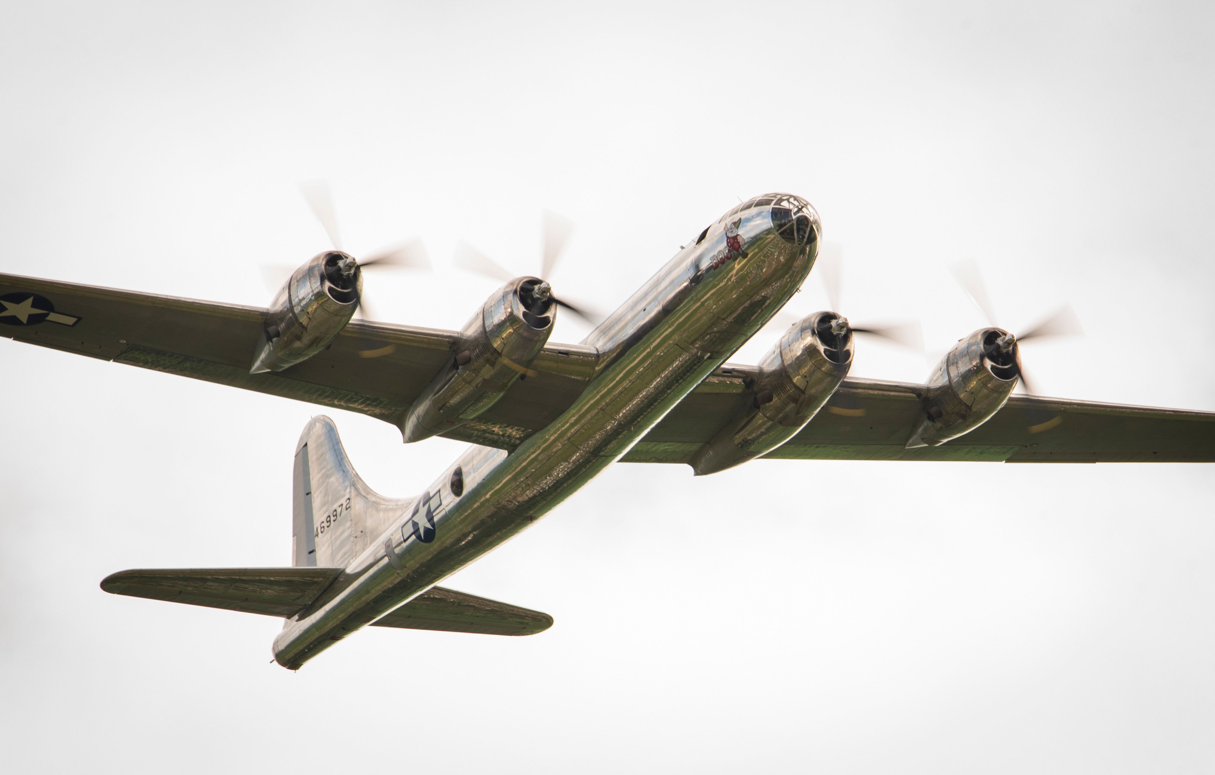 Vintage Military Aircraft Flying Overhead · Free Stock Photo