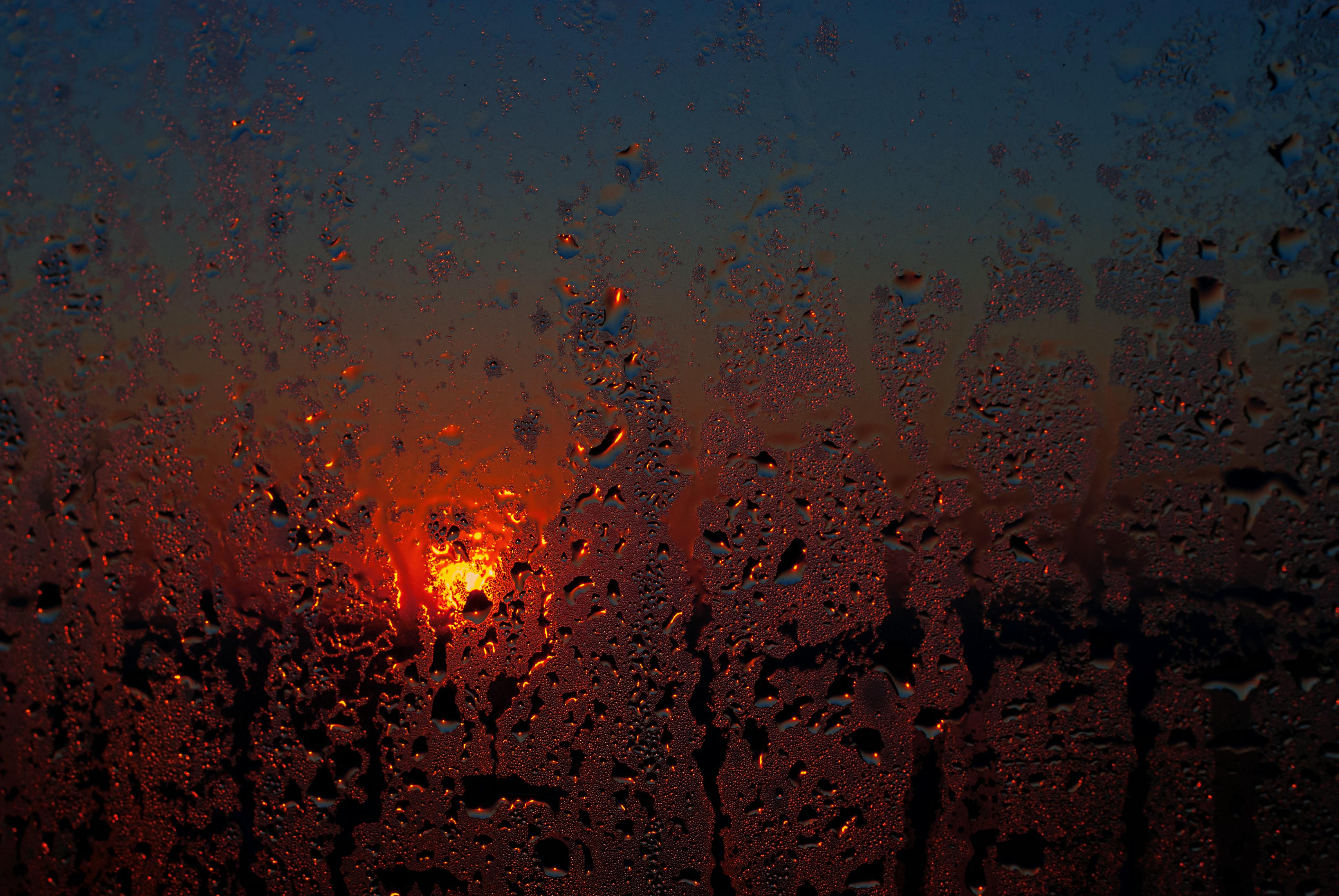 Sunset Through a Window with Rain Drops · Free Stock Photo