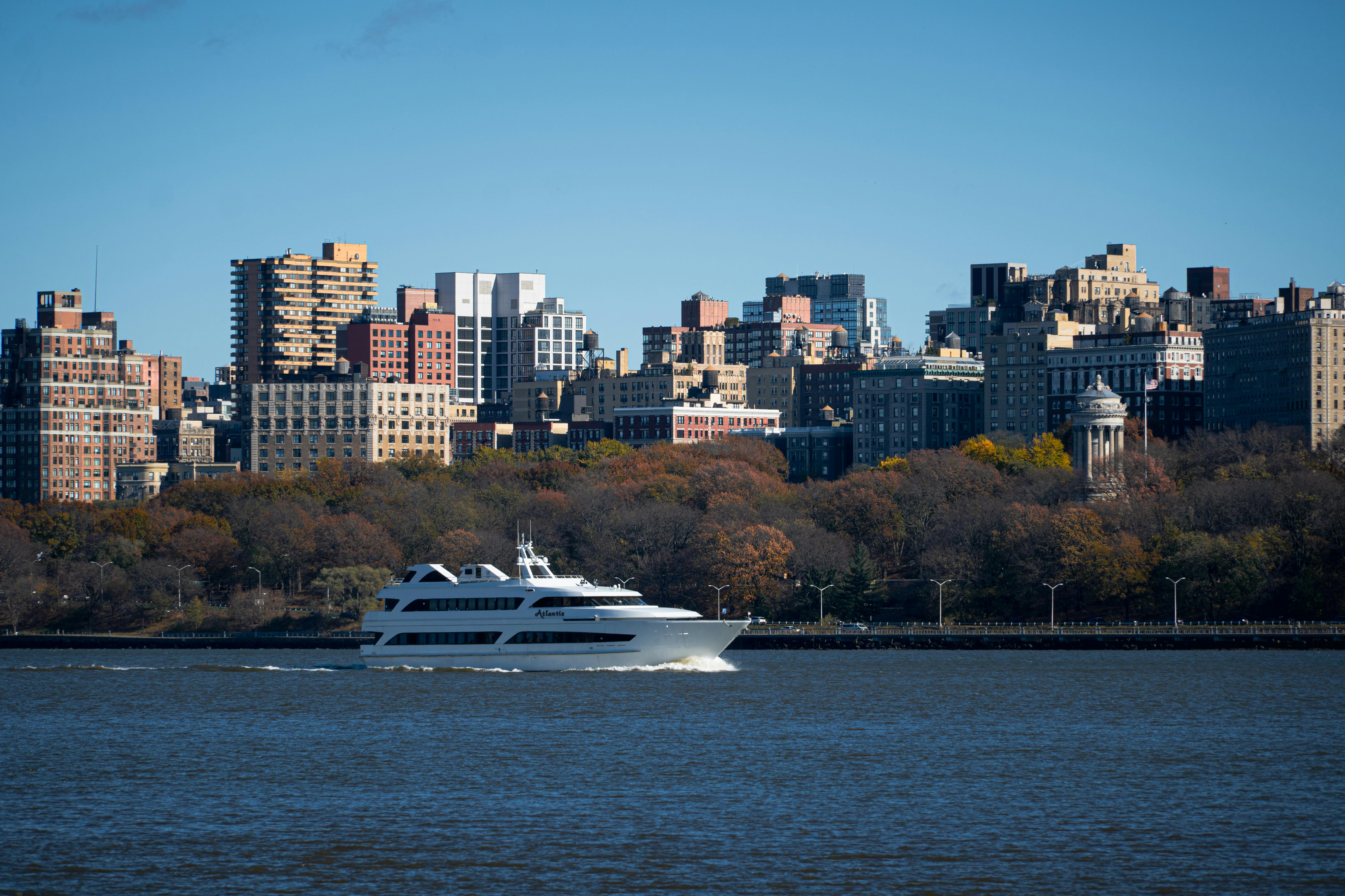 Scenic River View with Modern City Skyline · Free Stock Photo