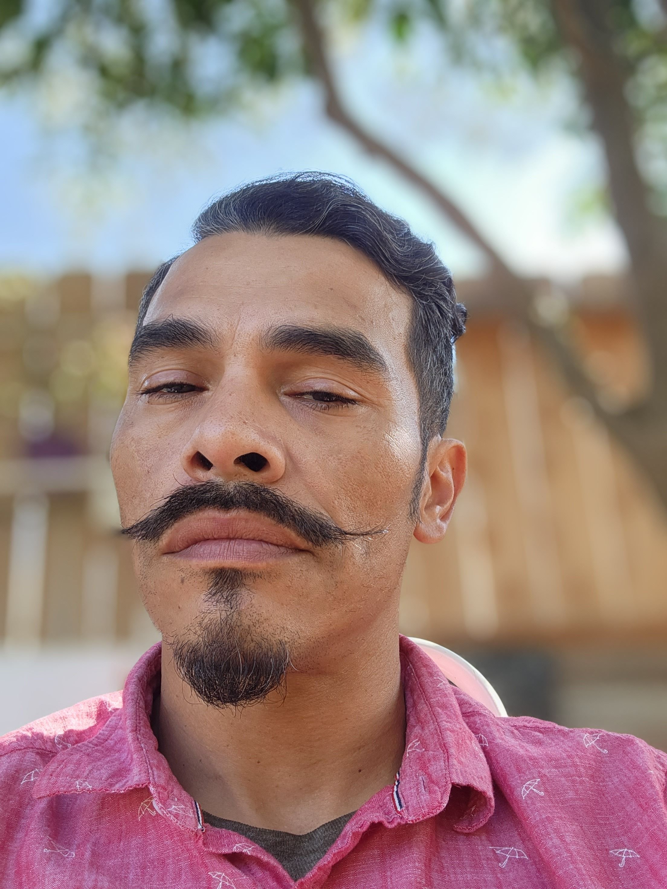 Confident Man with Retro Mustache Outdoors · Free Stock Photo