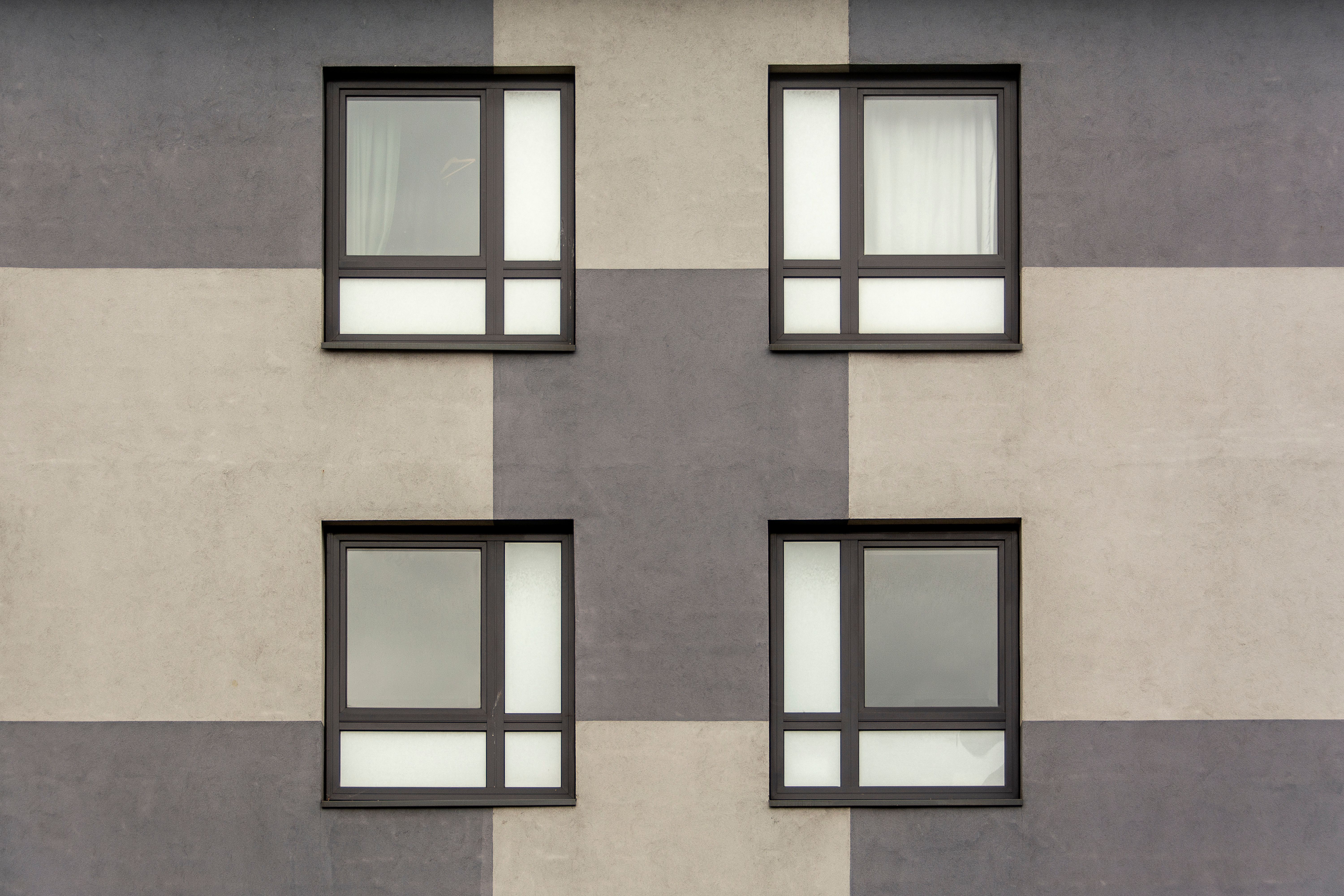 Symmetrical Building Facade with Windows · Free Stock Photo