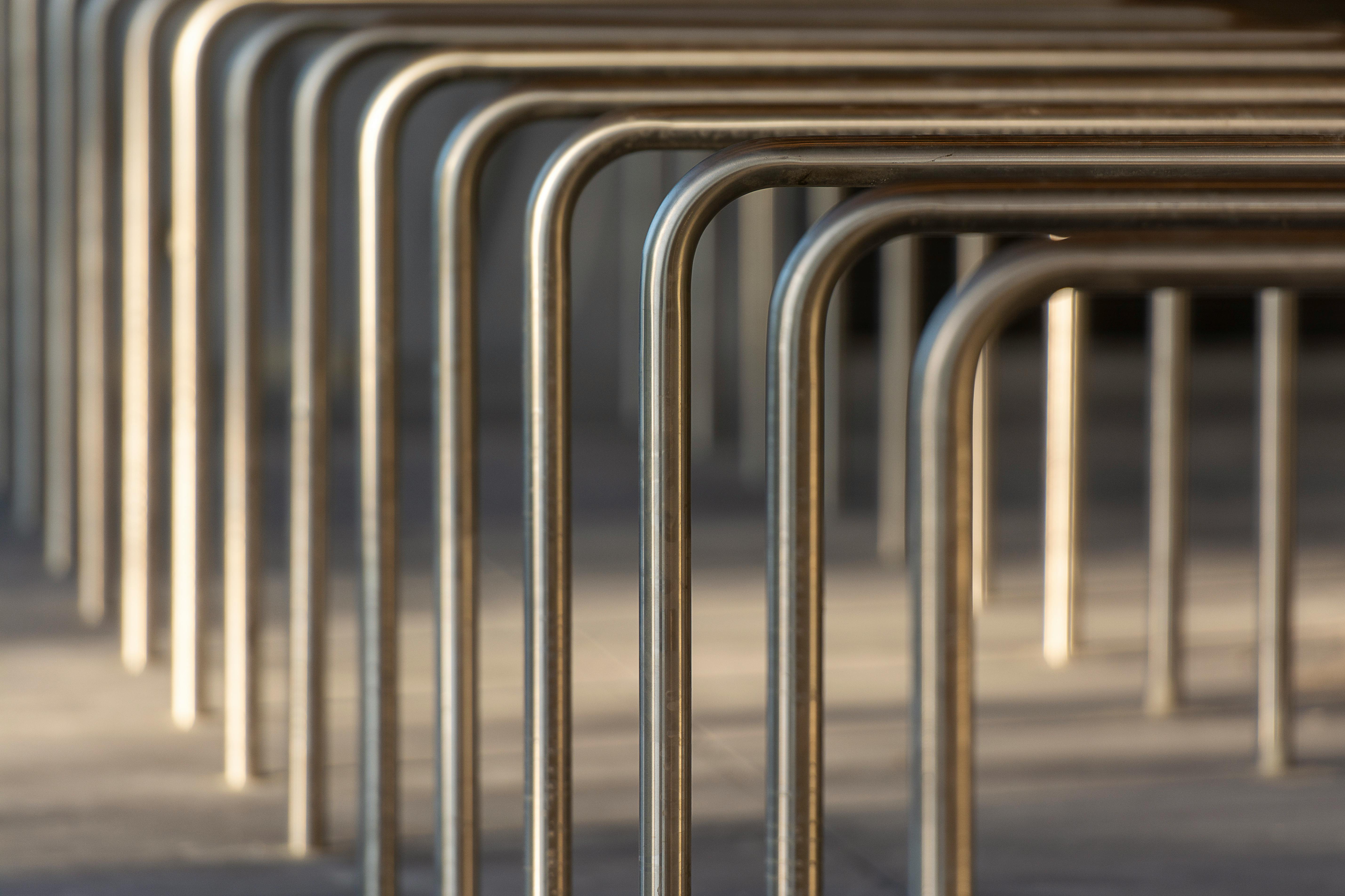 Abstract Pattern of Stainless Steel Bike Racks · Free Stock Photo