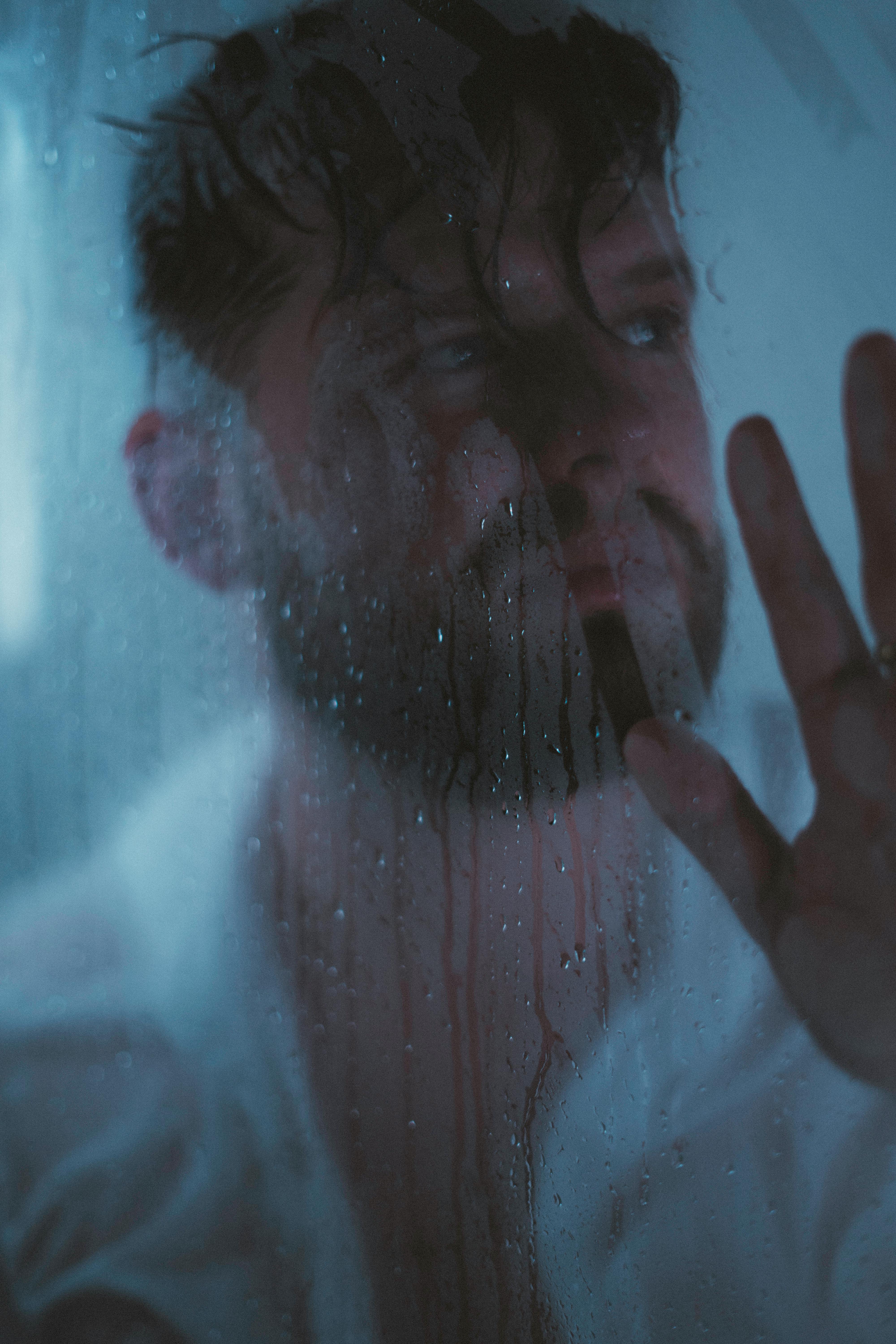 Melancholic Man Behind a Steamy Window · Free Stock Photo