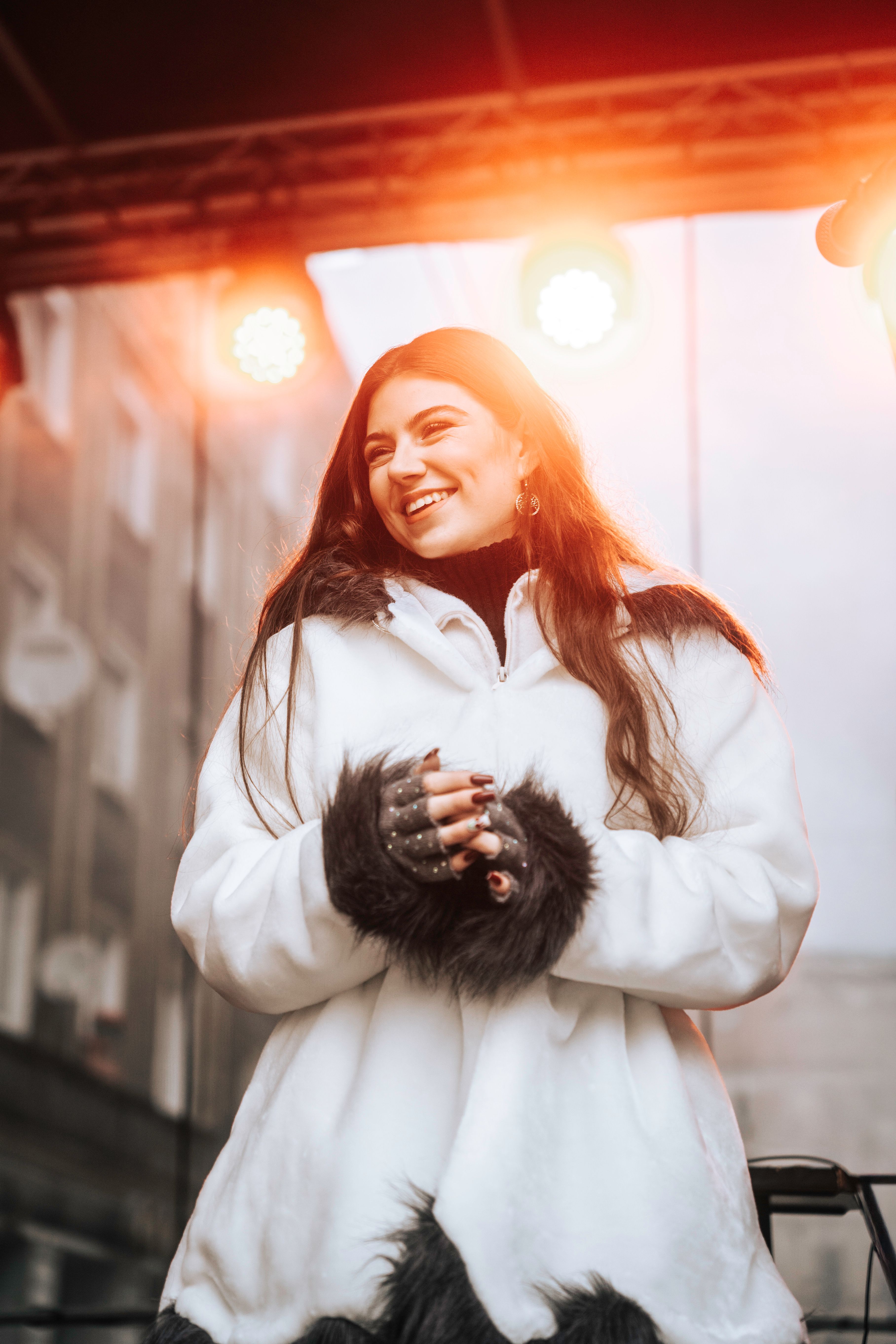 Female Vocalist Performing at Outdoor Concert · Free Stock Photo
