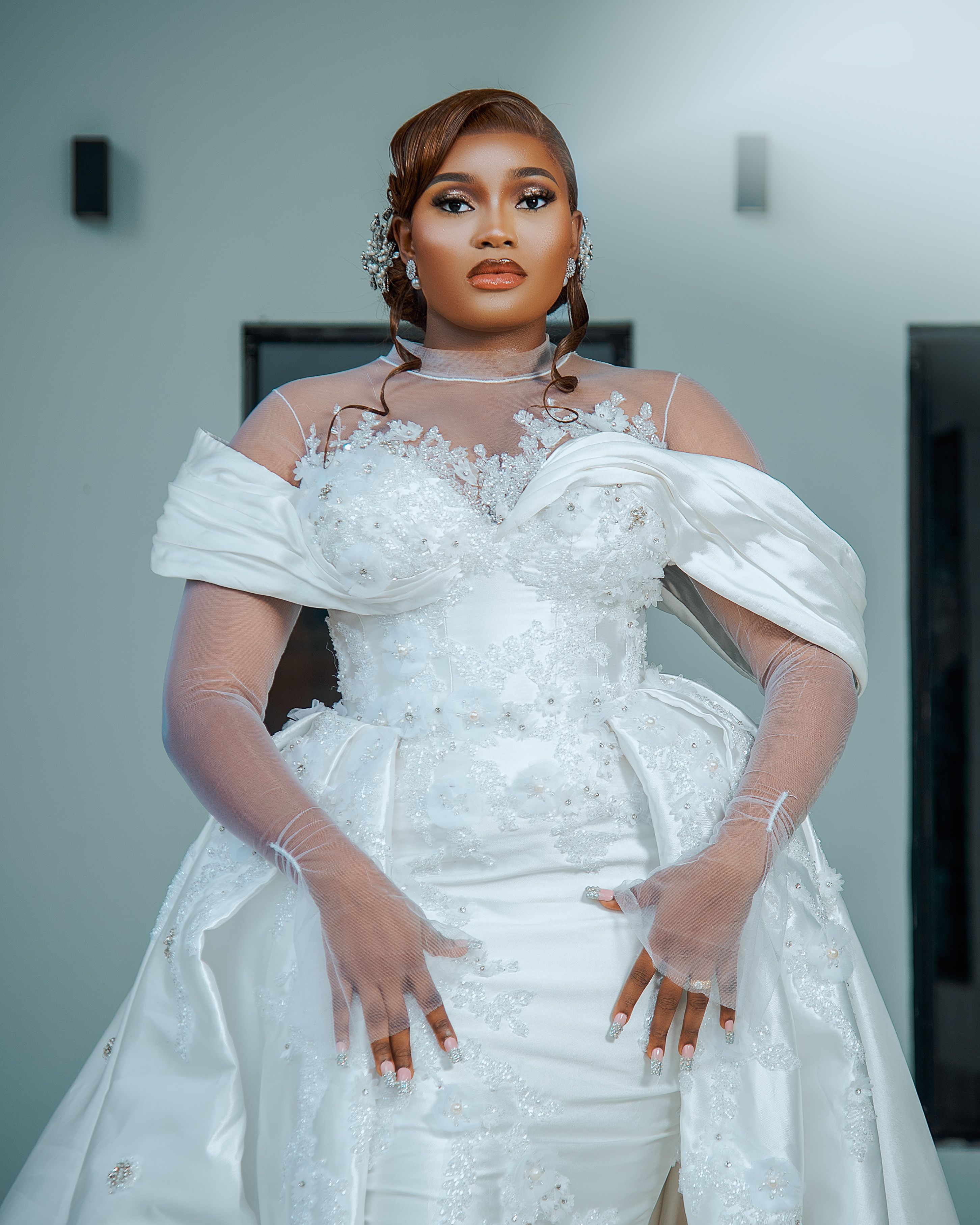 Person Posing in White Gown with Arms Spread · Free Stock Photo