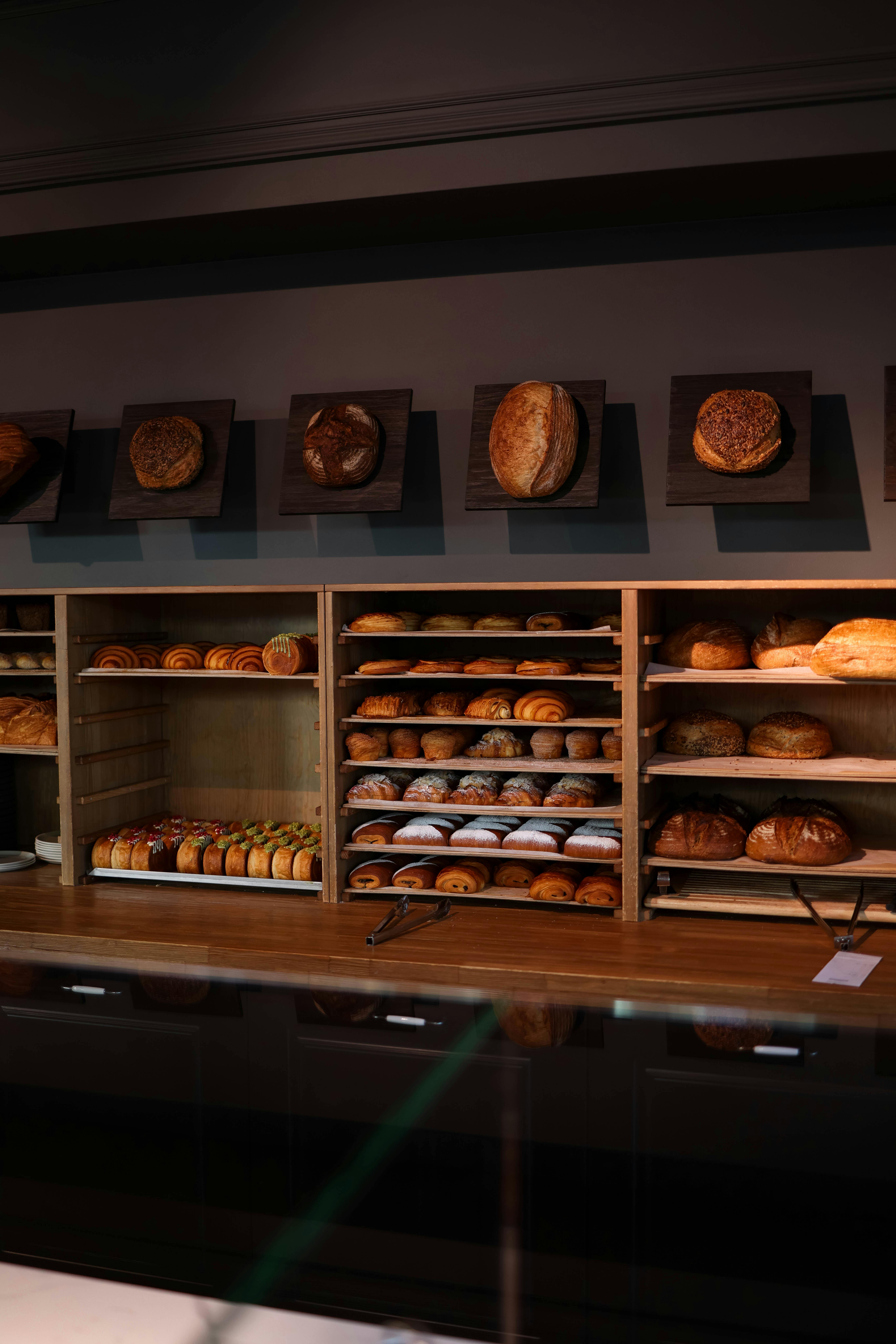 Artisanal Bakery Display with Fresh Bread · Free Stock Photo