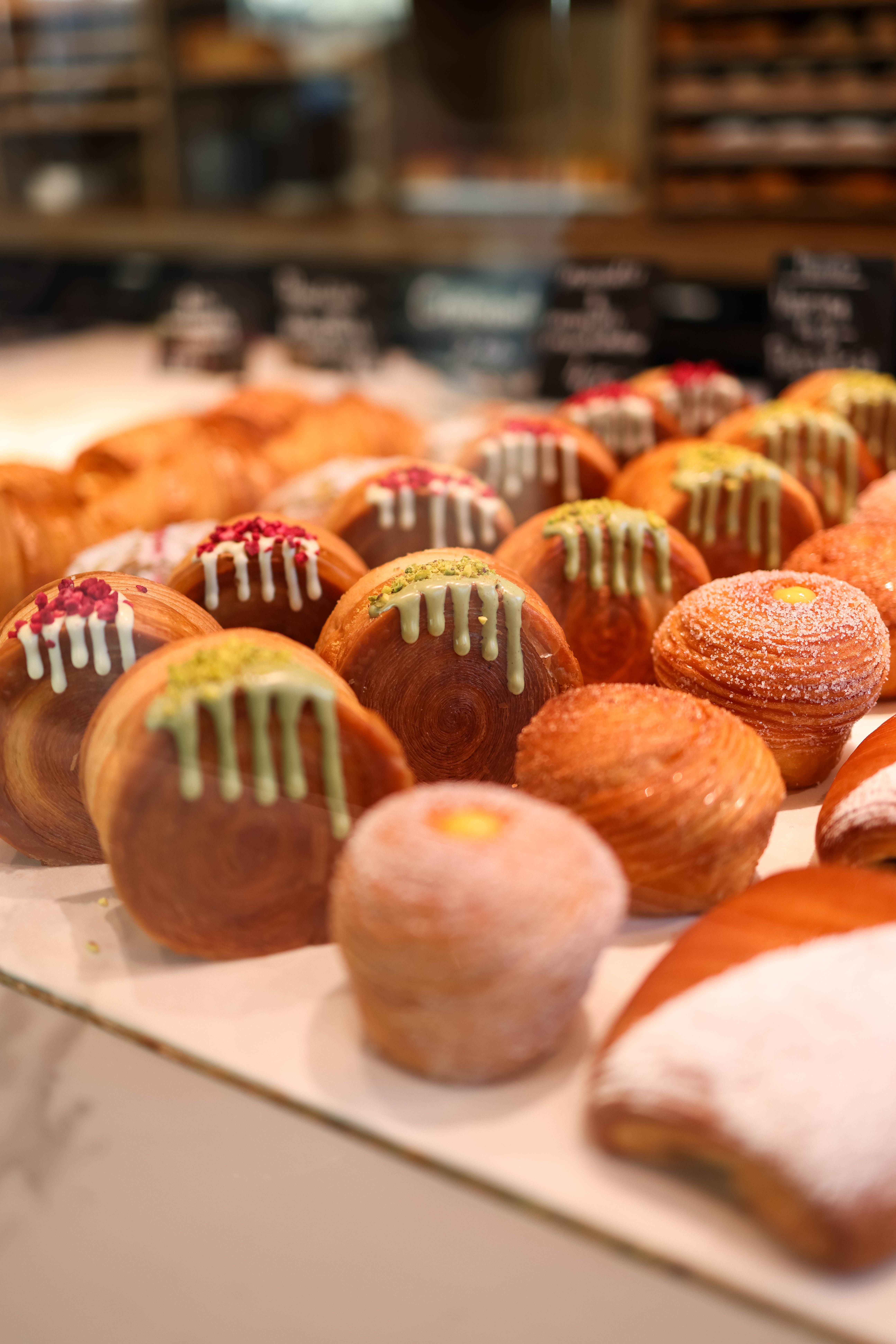 Assorted Pastries in a Bakery Display · Free Stock Photo