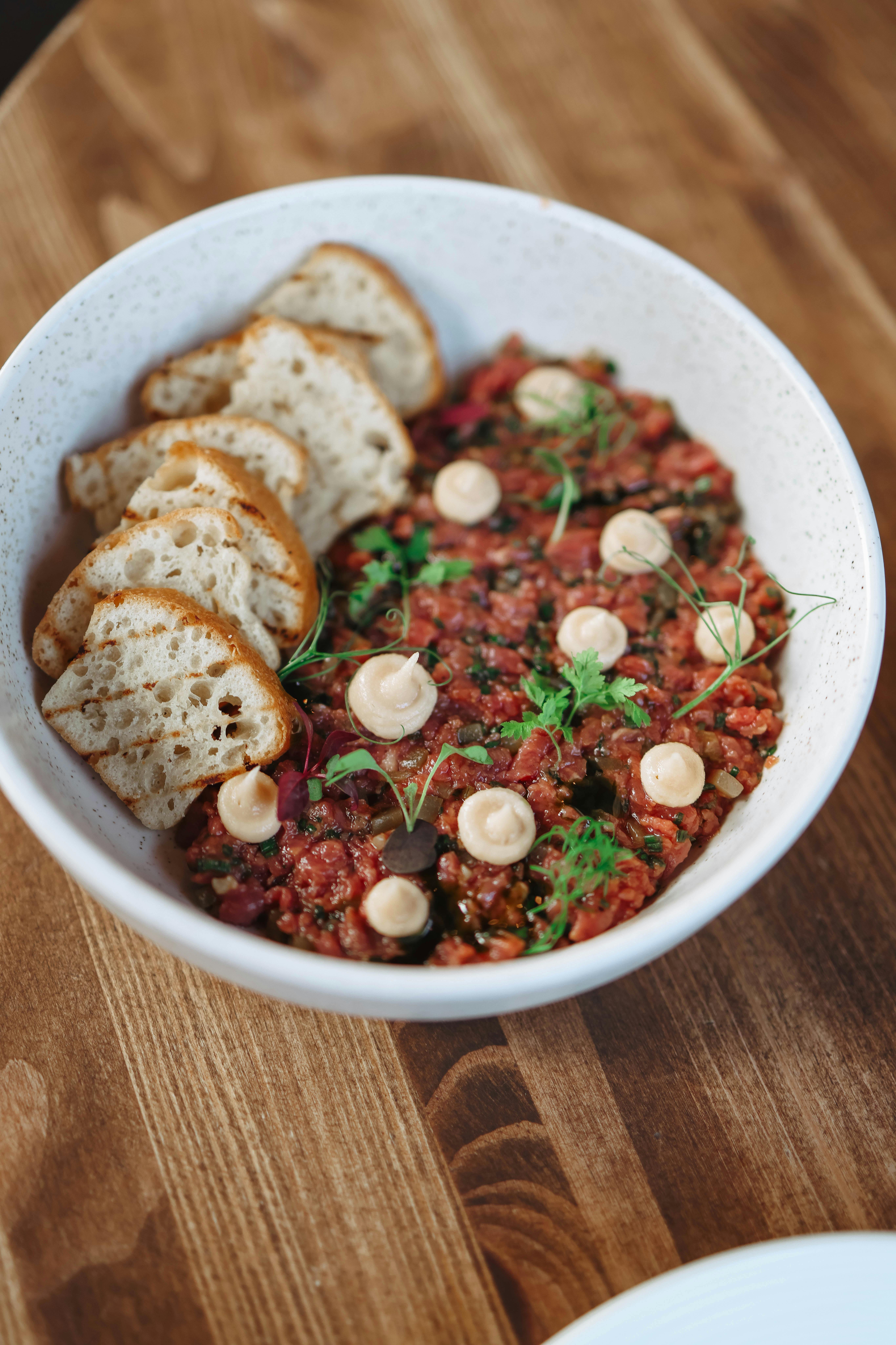 Gourmet Tartare Dish with Crisp Toast · Free Stock Photo