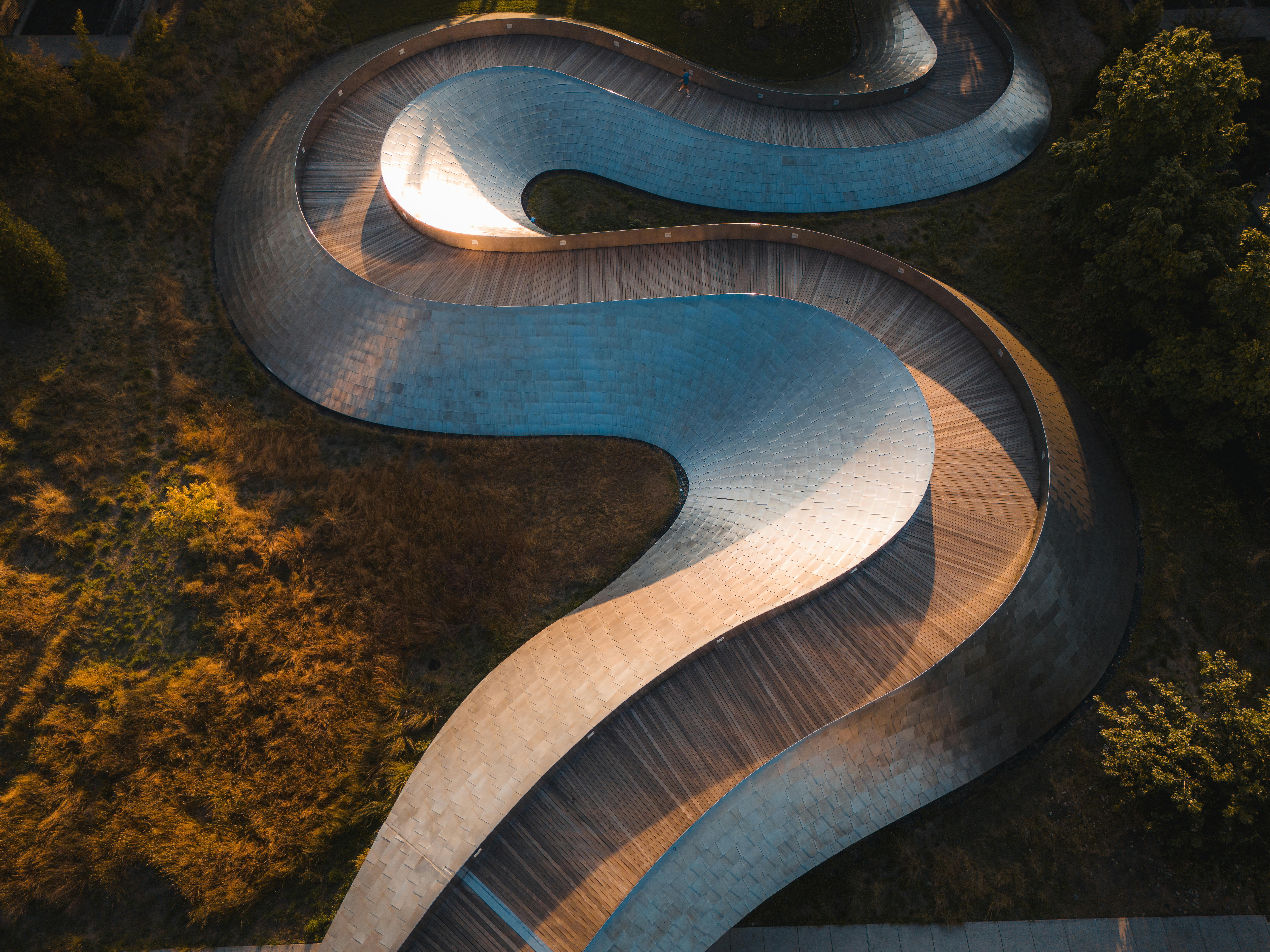 Aerial View of Modern Curved Pathway · Free Stock Photo