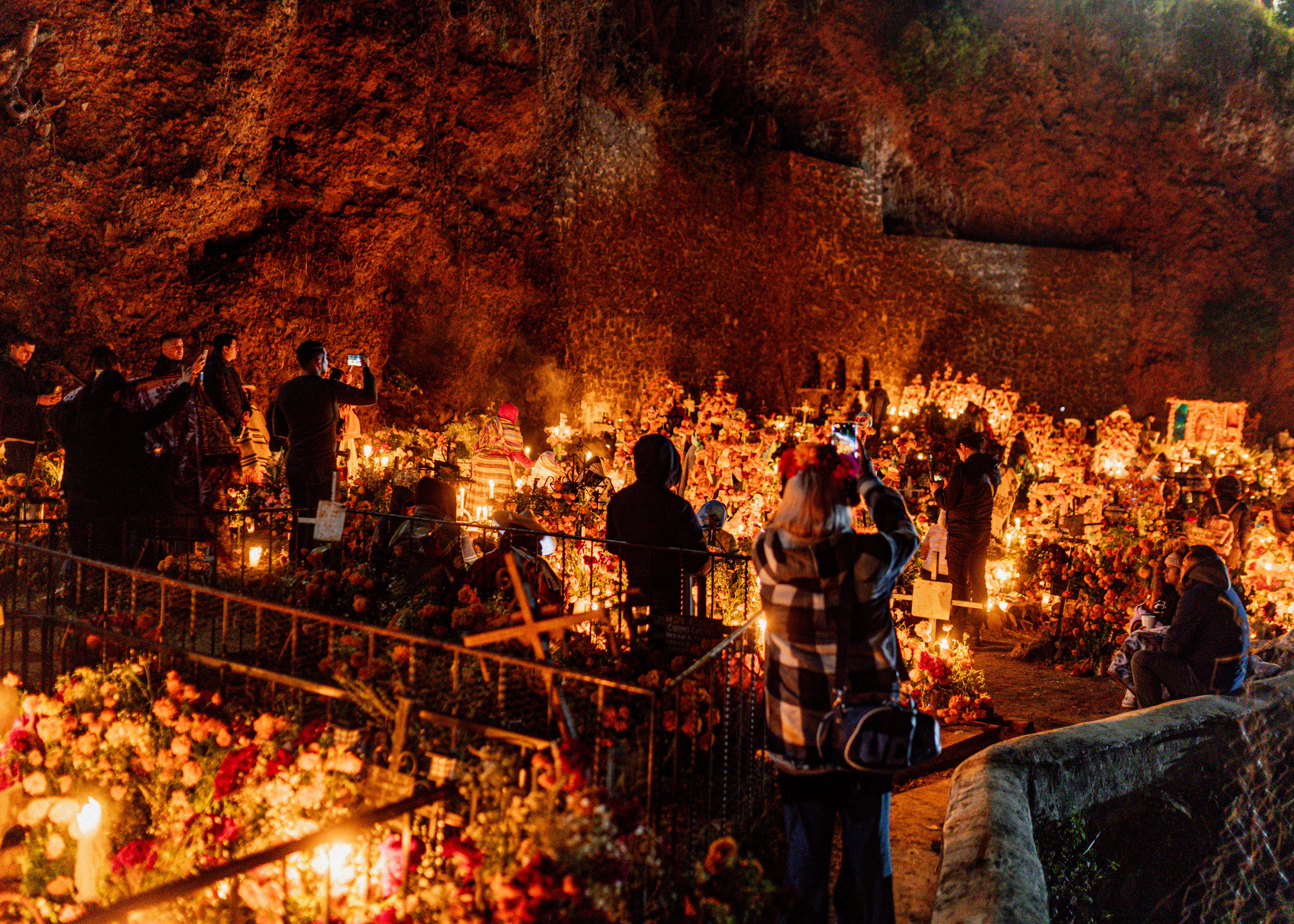 Vibrant Night Cemetery Gathering for Day of the Dead · Free Stock Photo