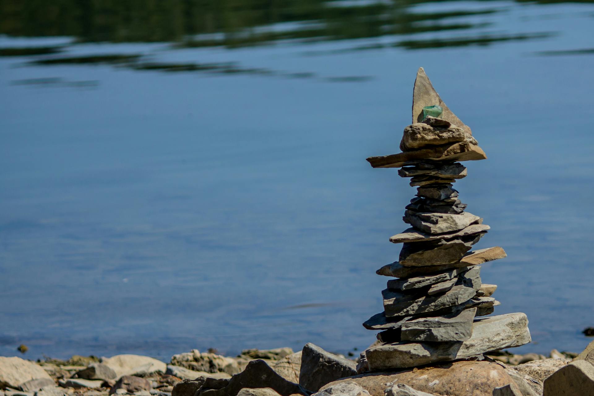 Free stock photo of hemlock lake, rock stack, stone pile