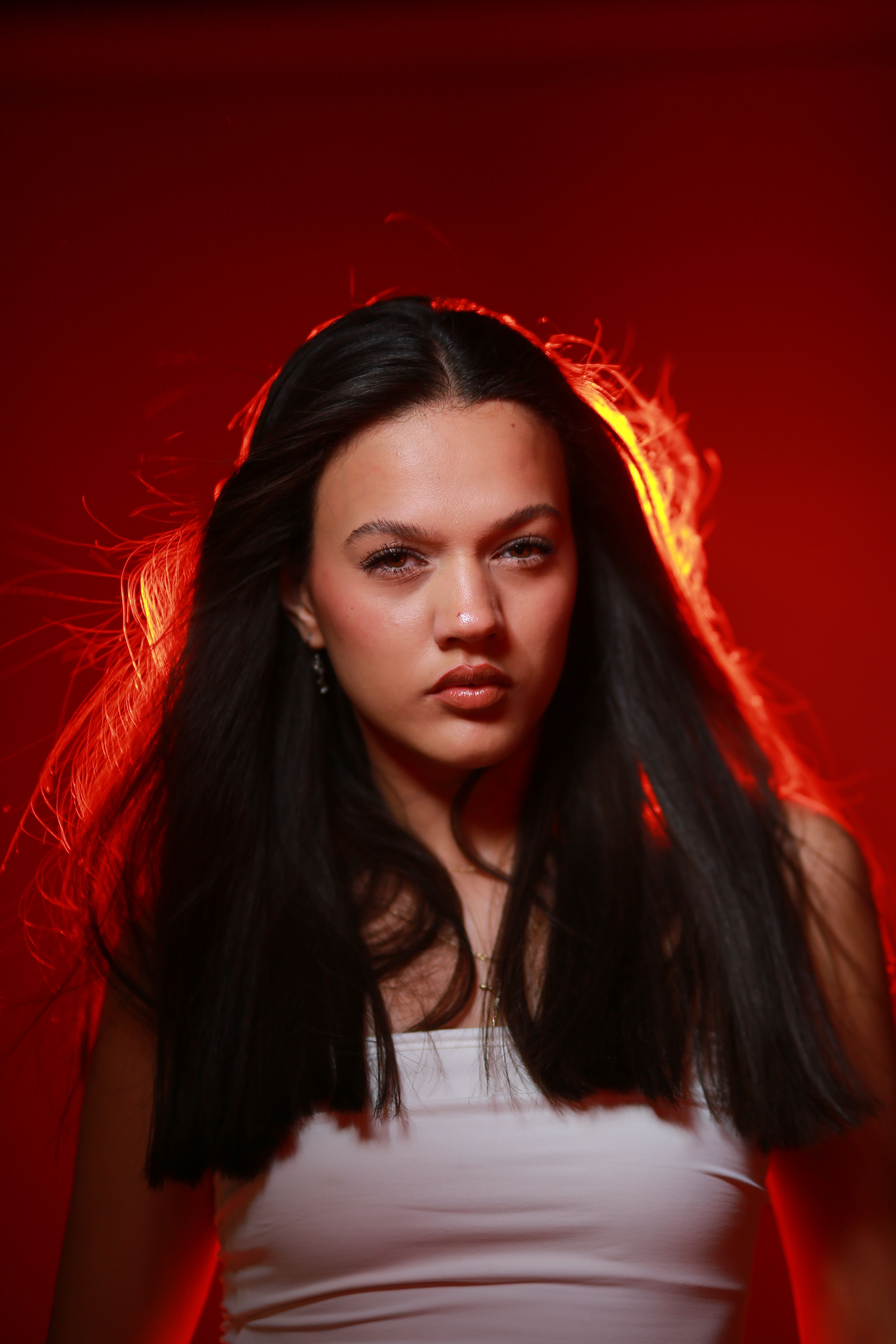Dramatic Portrait of Woman with Red Lighting · Free Stock Photo