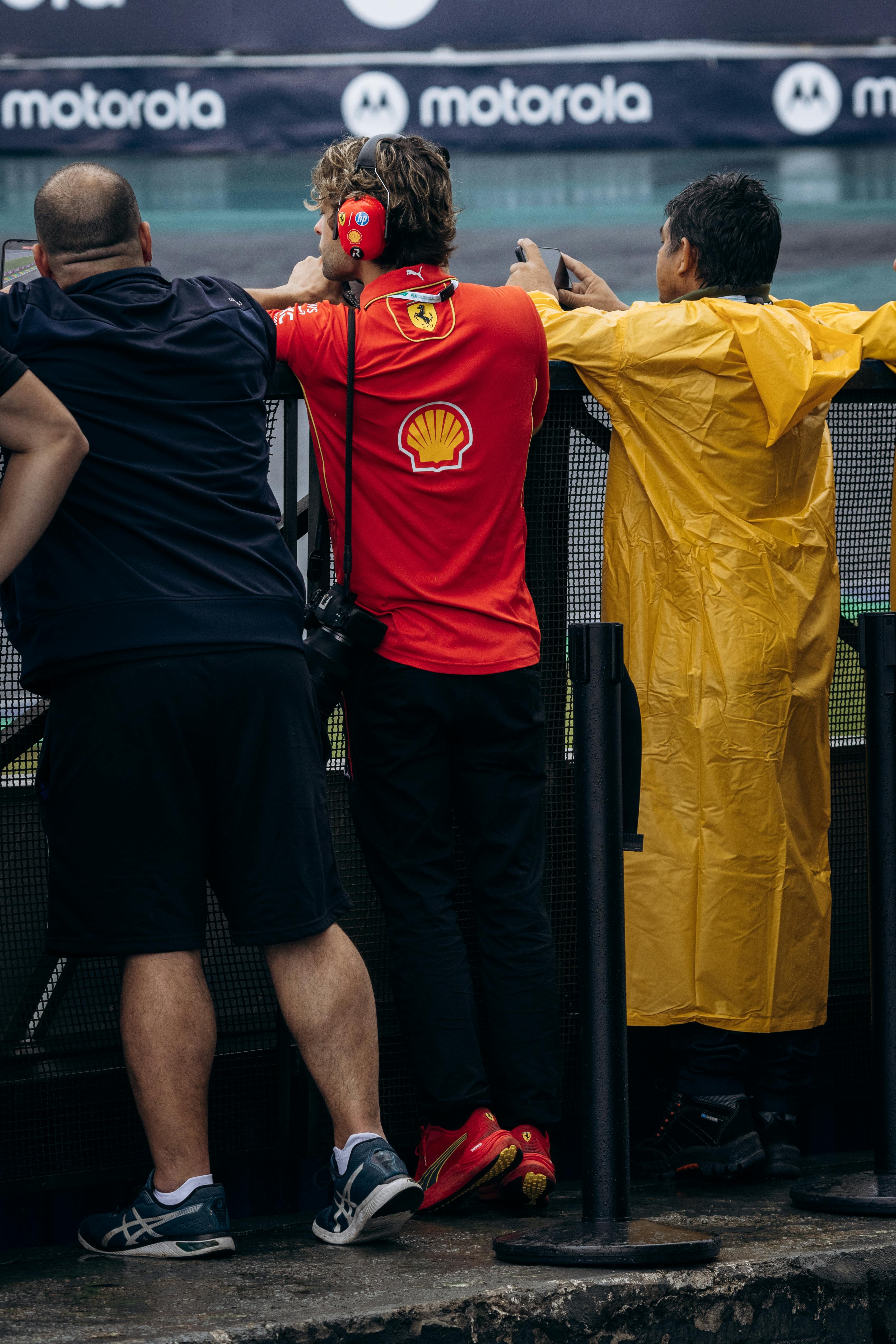 Race Enthusiasts Watching from Trackside · Free Stock Photo