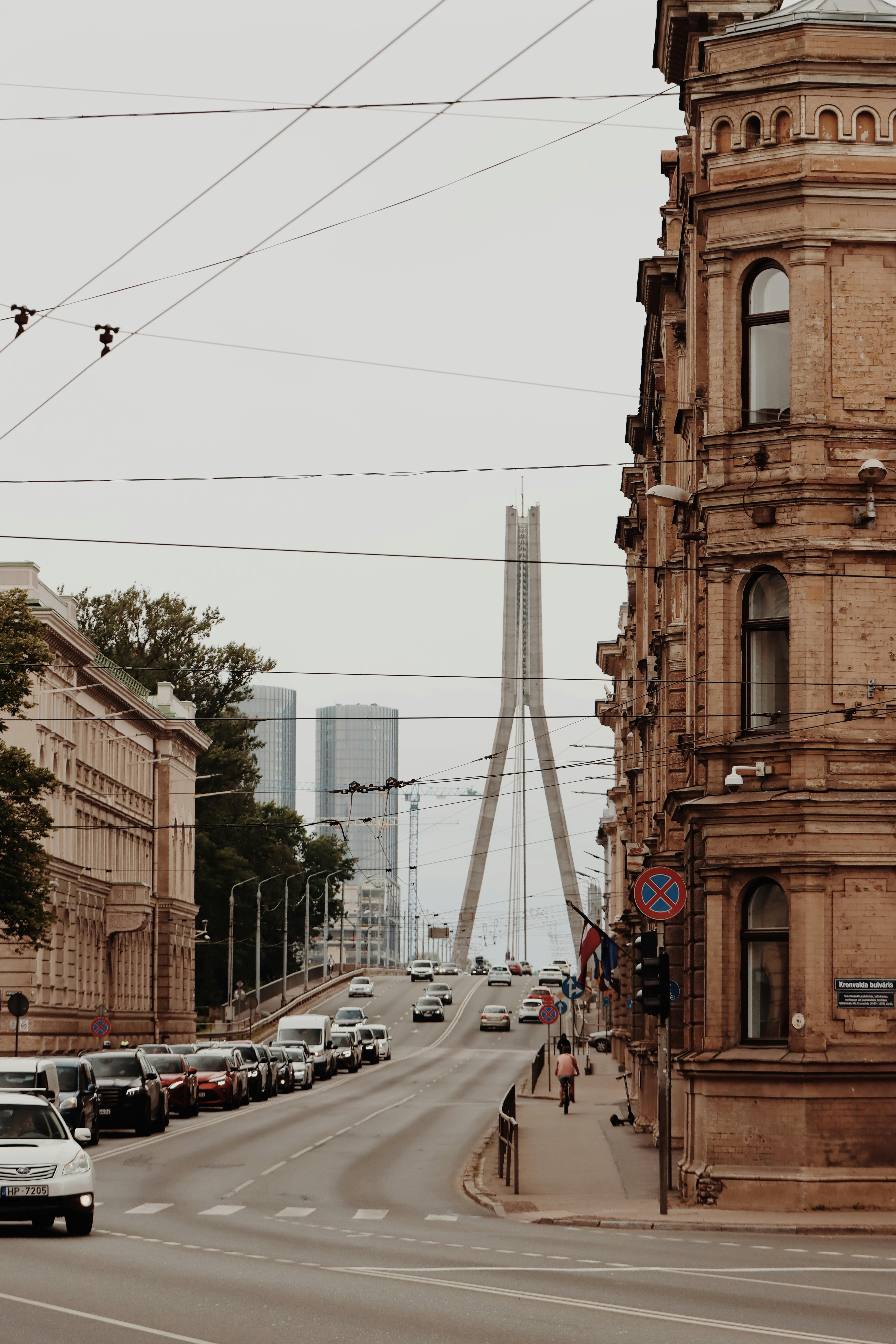 Scenic View of Riga's Iconic Bridge and Street · Free Stock Photo