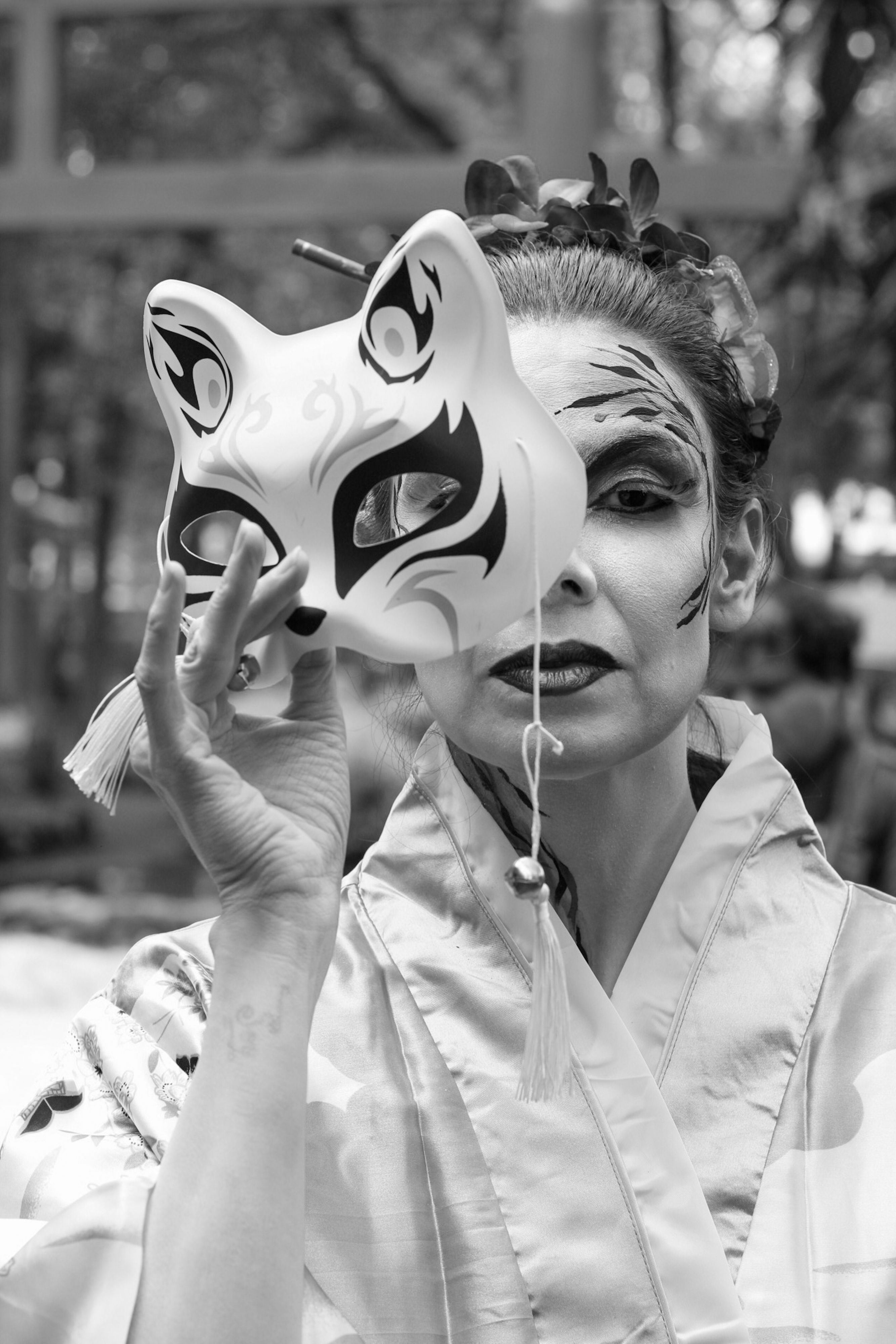 Traditional Kitsune Mask Performer Outdoors · Free Stock Photo