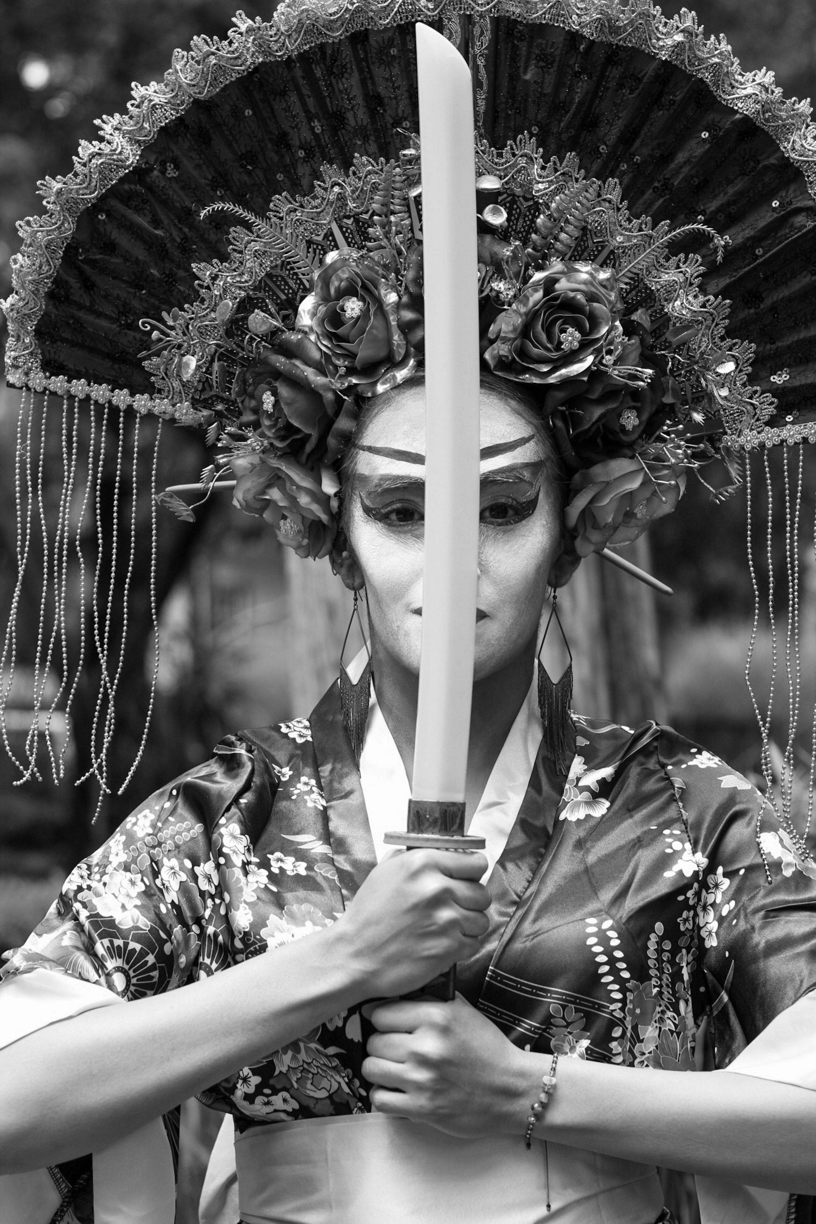 Striking Black and White Geisha with Sword · Free Stock Photo