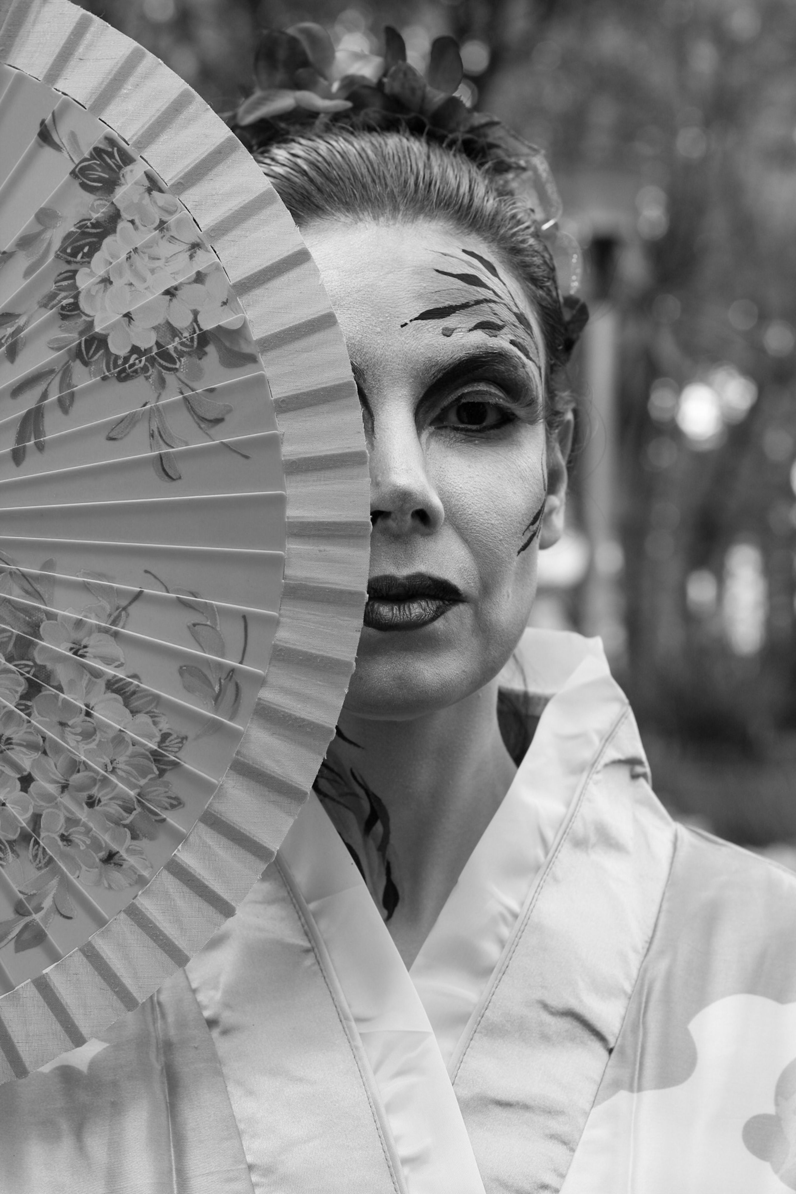 Artistic Portrait of Woman with Fan in Monochrome · Free Stock Photo