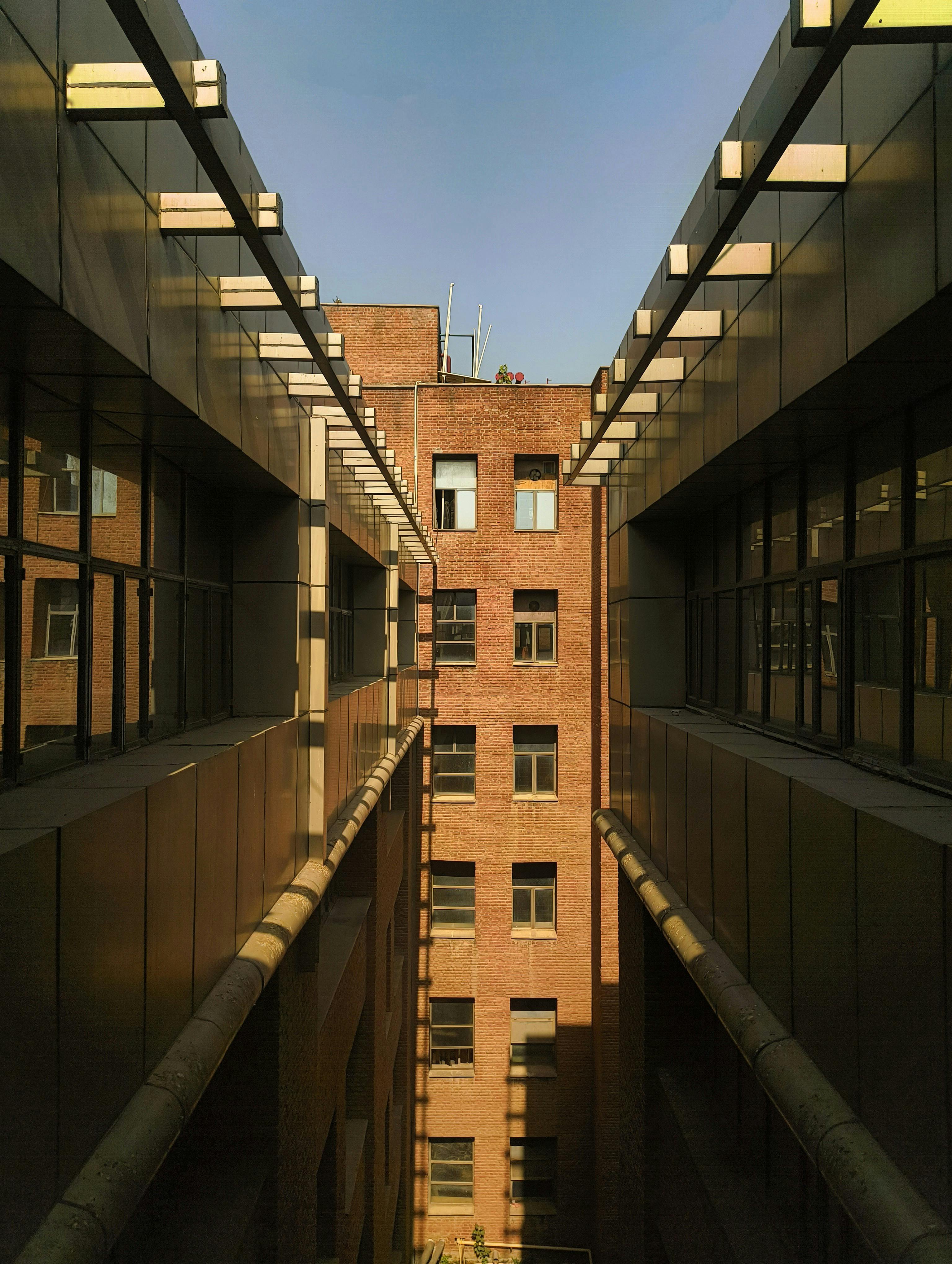 Architectural Symmetry in Urban Building Design · Free Stock Photo