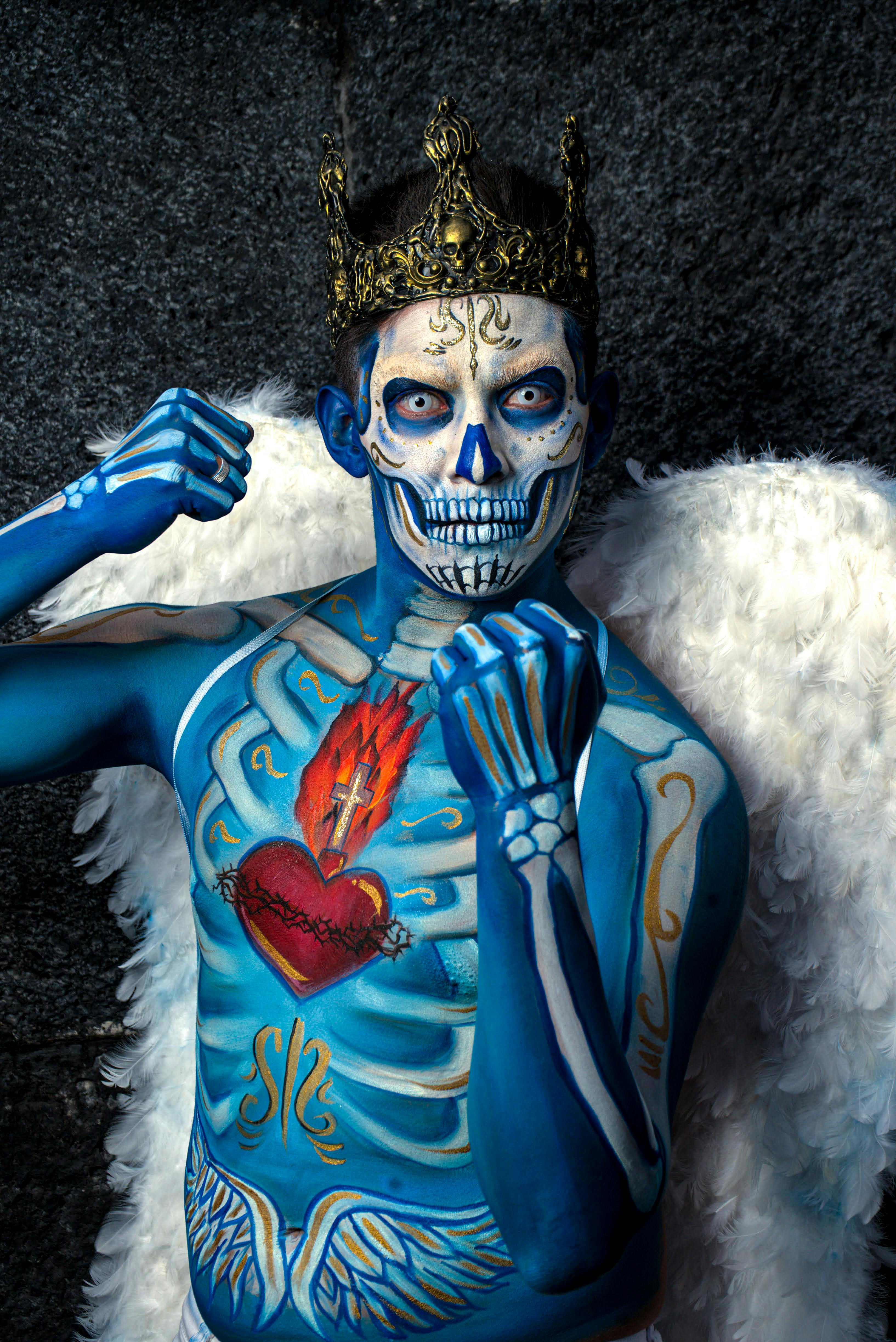 Colorful Body Art with Skull Face and Crown · Free Stock Photo
