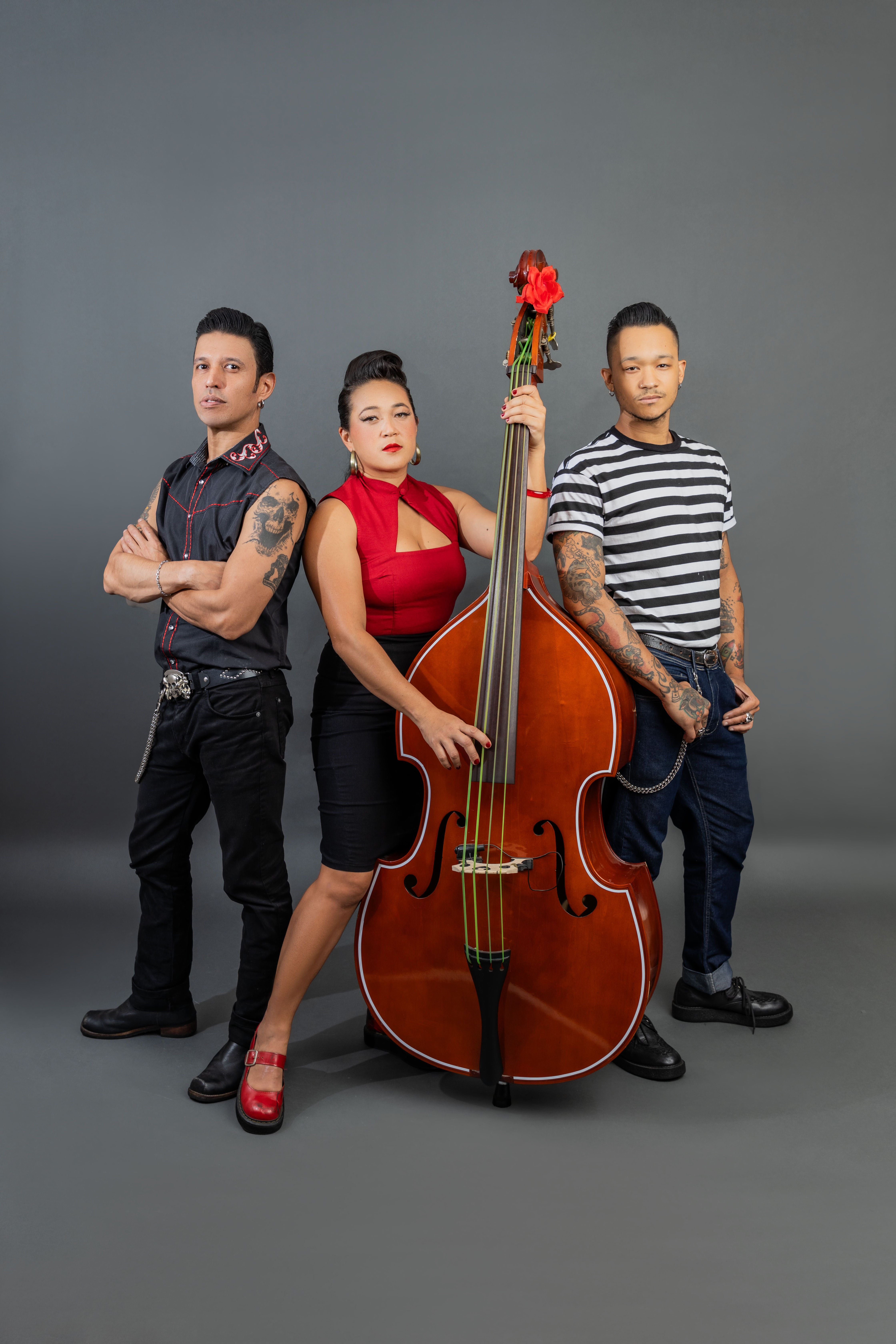 Vibrant Musical Trio with Double Bass · Free Stock Photo