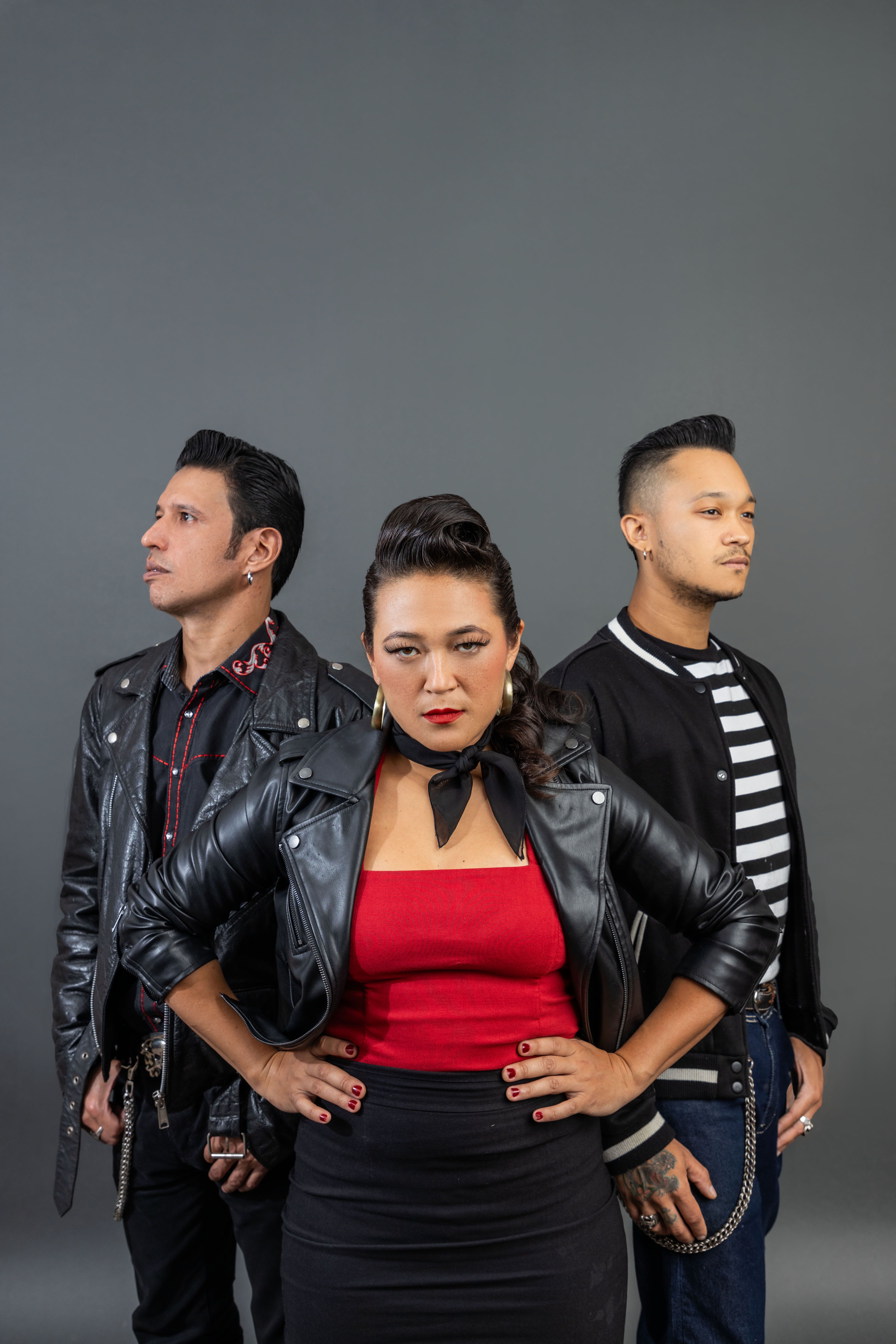 Vintage Rockabilly Band Portrait with Leather Jackets · Free Stock Photo