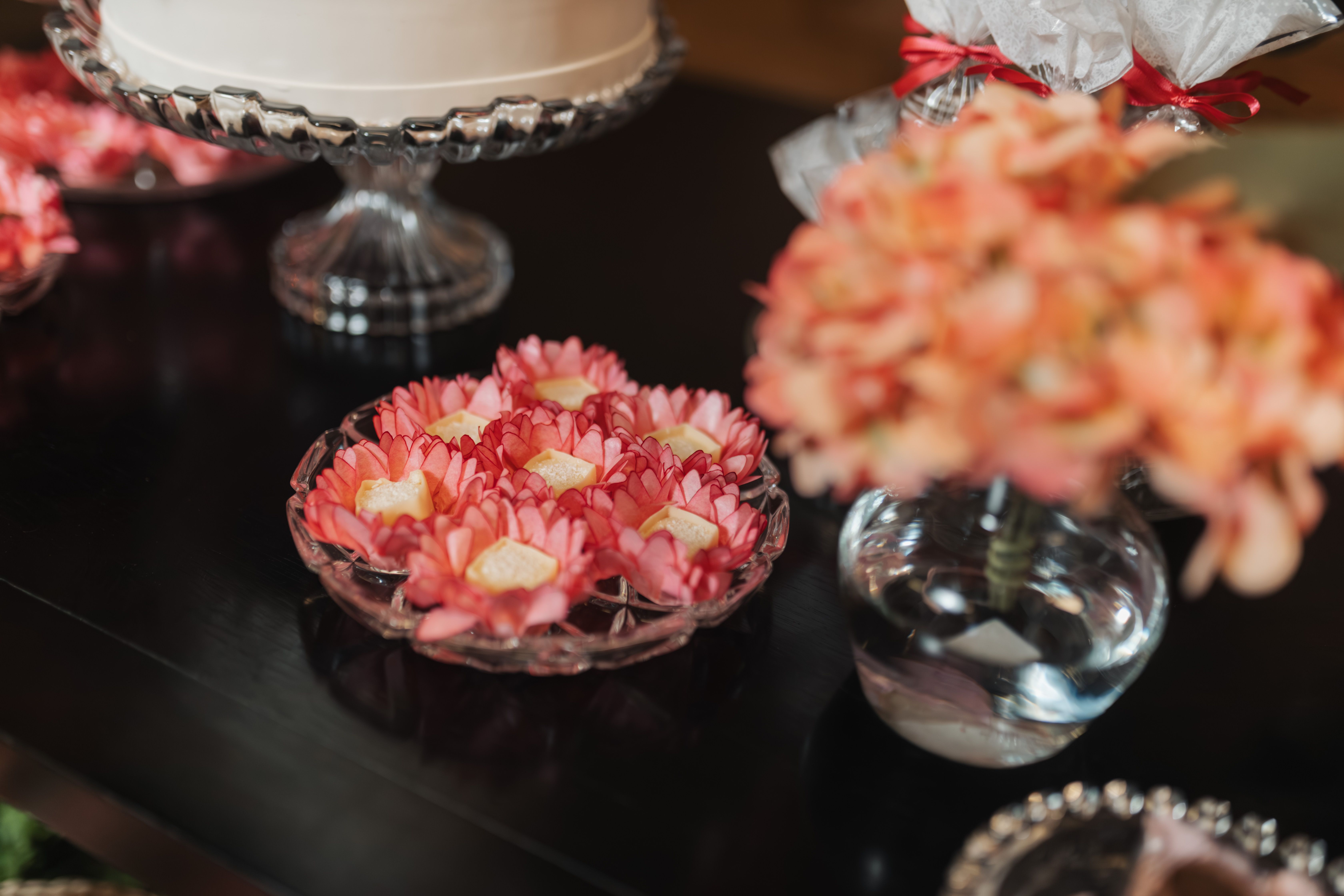 Elegant Dessert Table with Floral Decor · Free Stock Photo