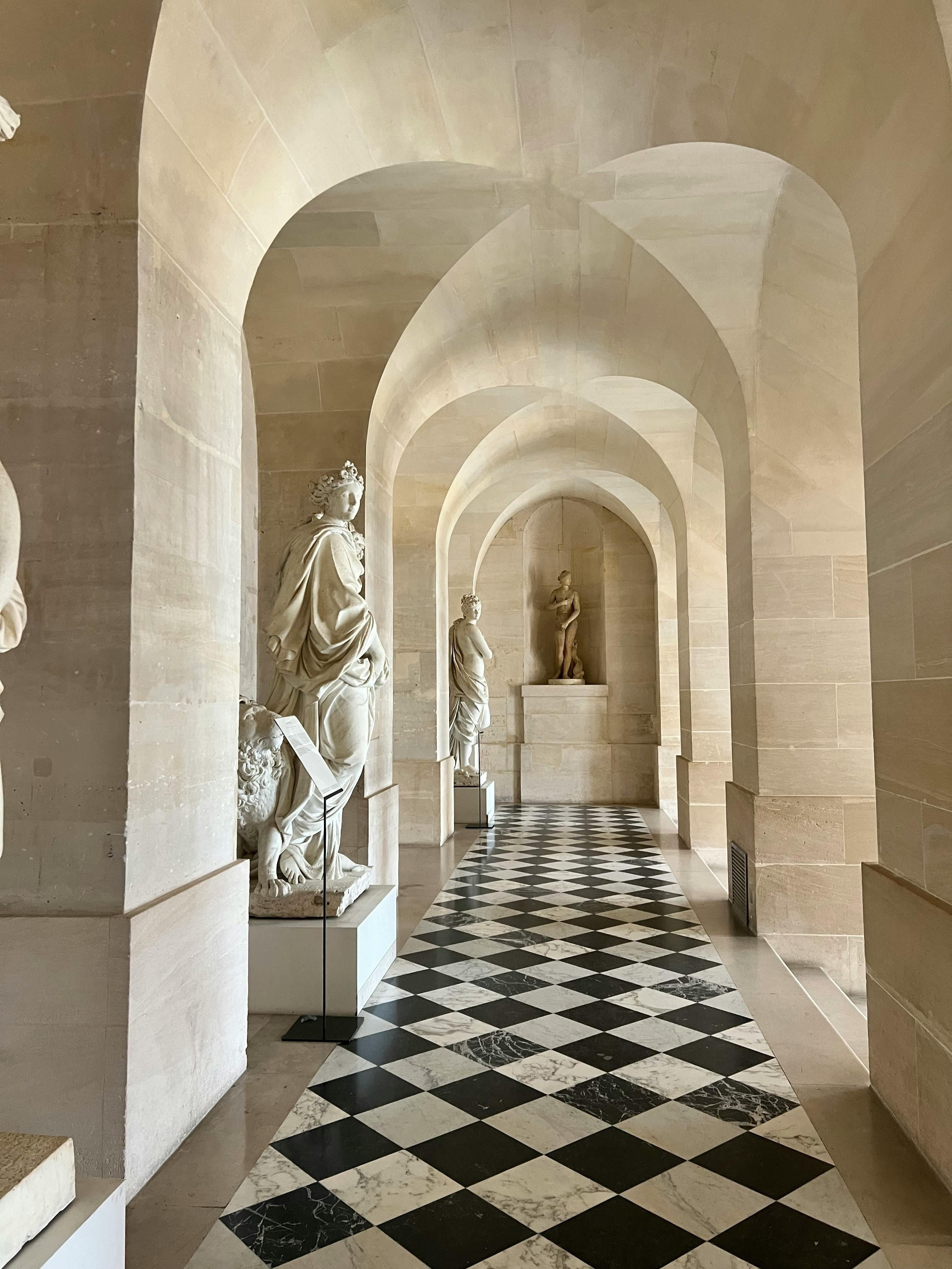 Elegant Corridor with Classical Sculptures in Versailles · Free Stock Photo