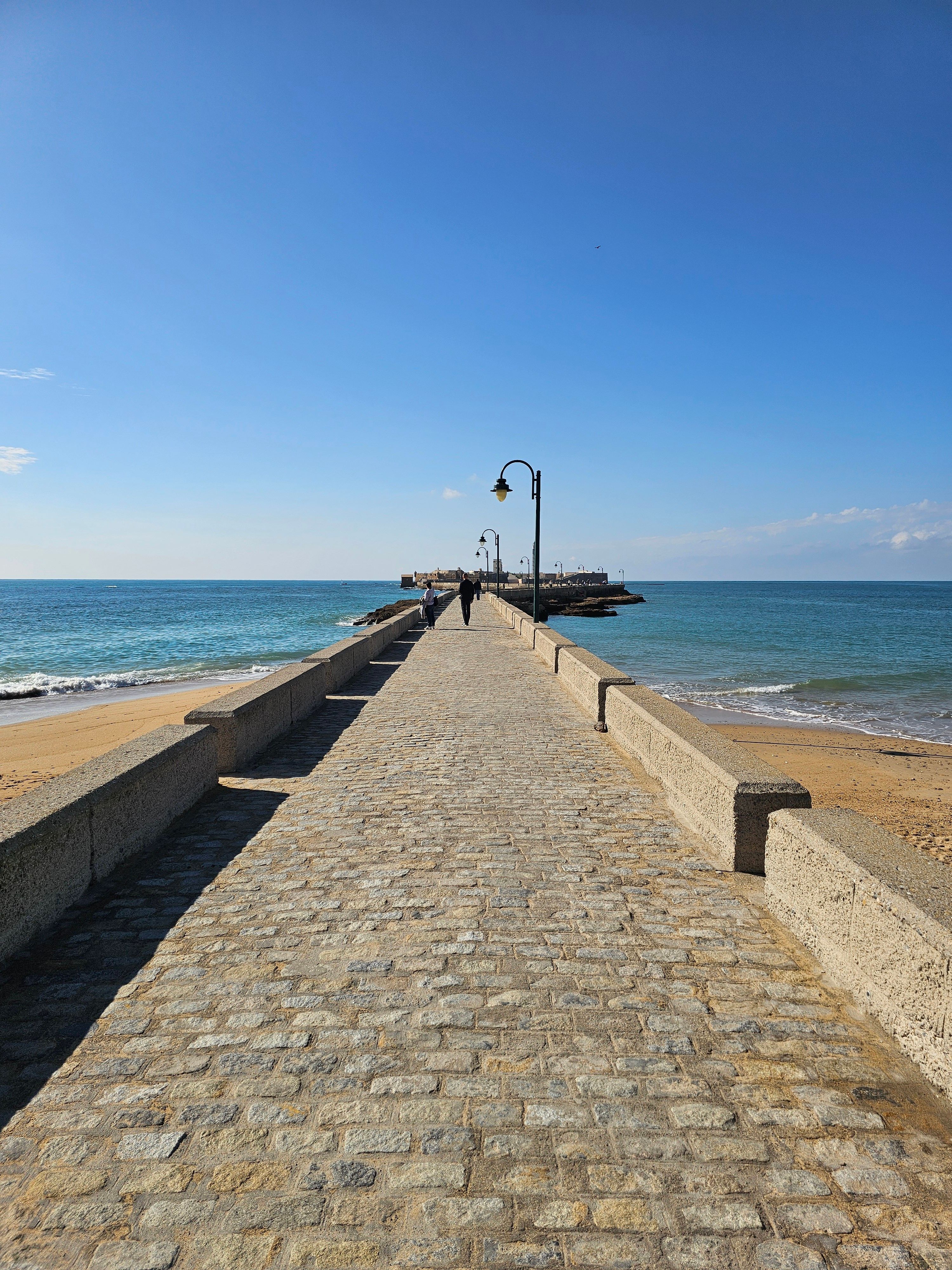 Cádiz Beach Pier with Sunny Blue Sky · Free Stock Photo