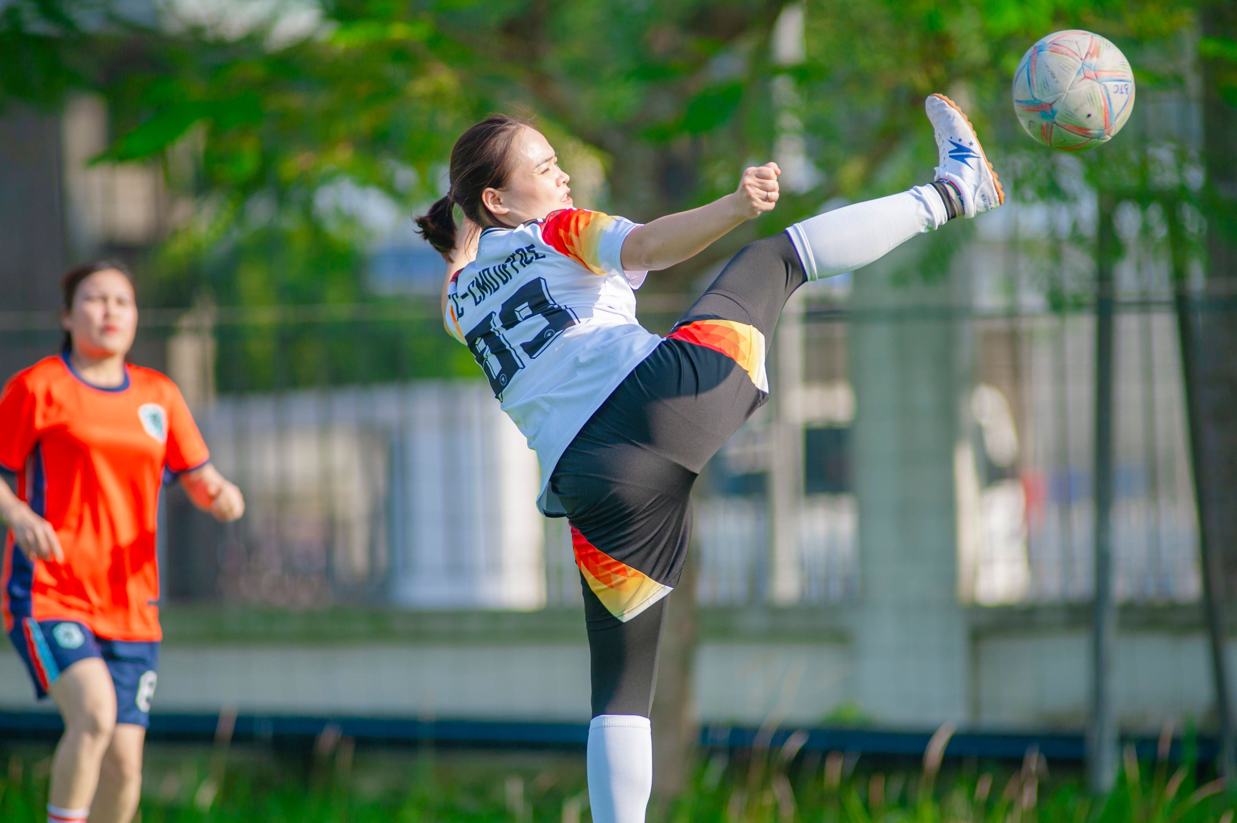 Women Playing Soccer Outdoors in Hanoi · Free Stock Photo