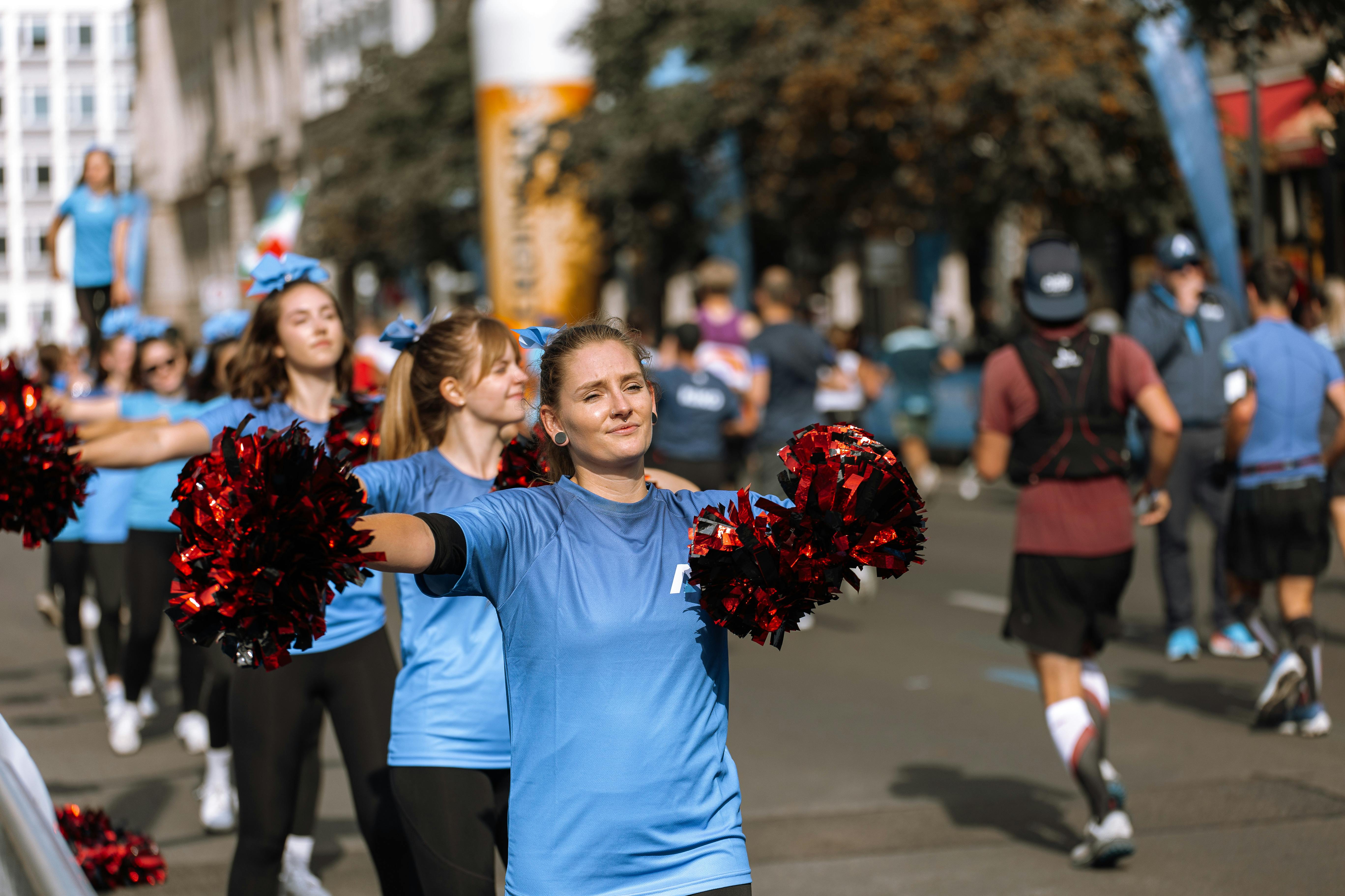 Cheerleaders at Outdoor Sporting Event · Free Stock Photo