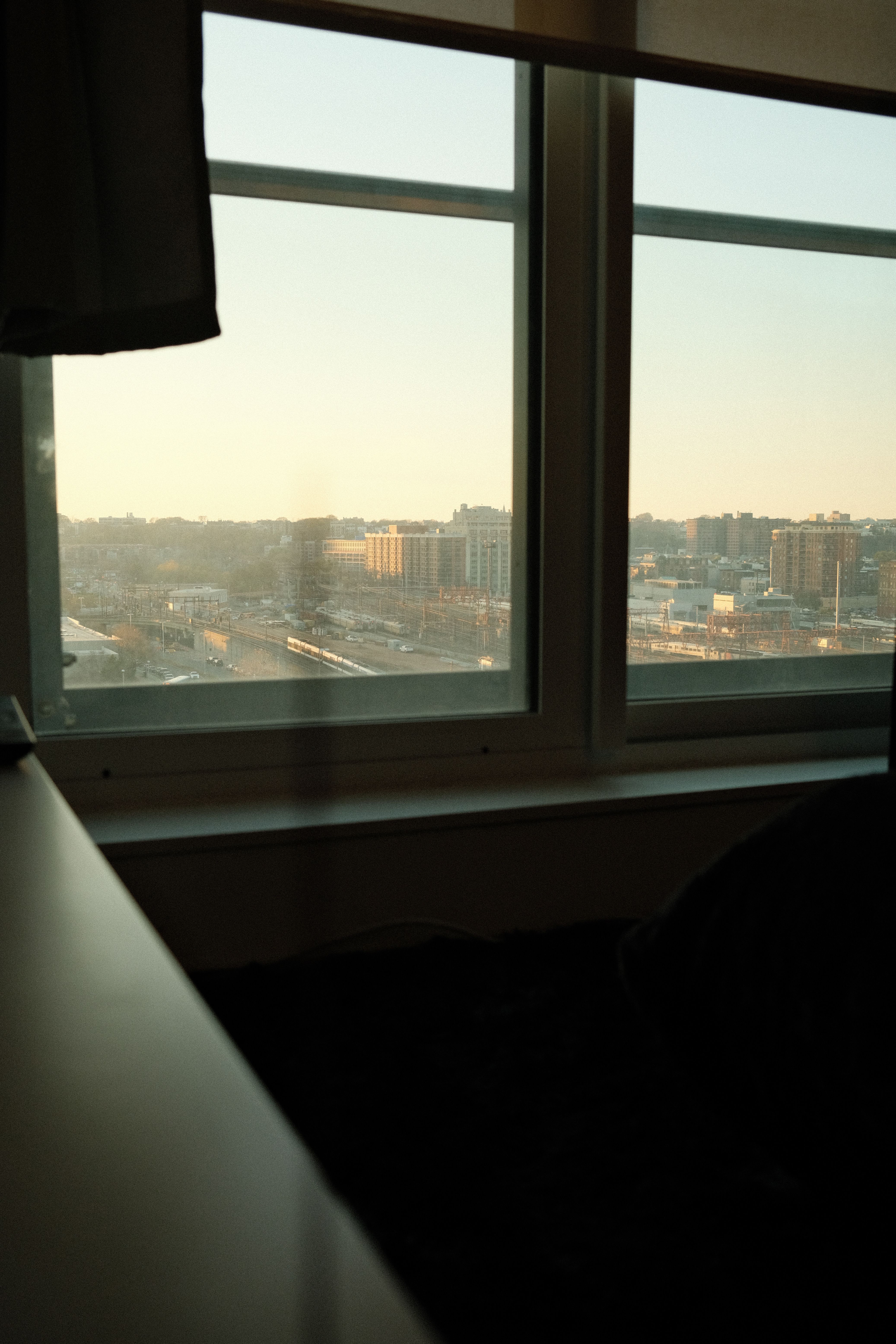 Cityscape View from a Window during Golden Hour · Free Stock Photo
