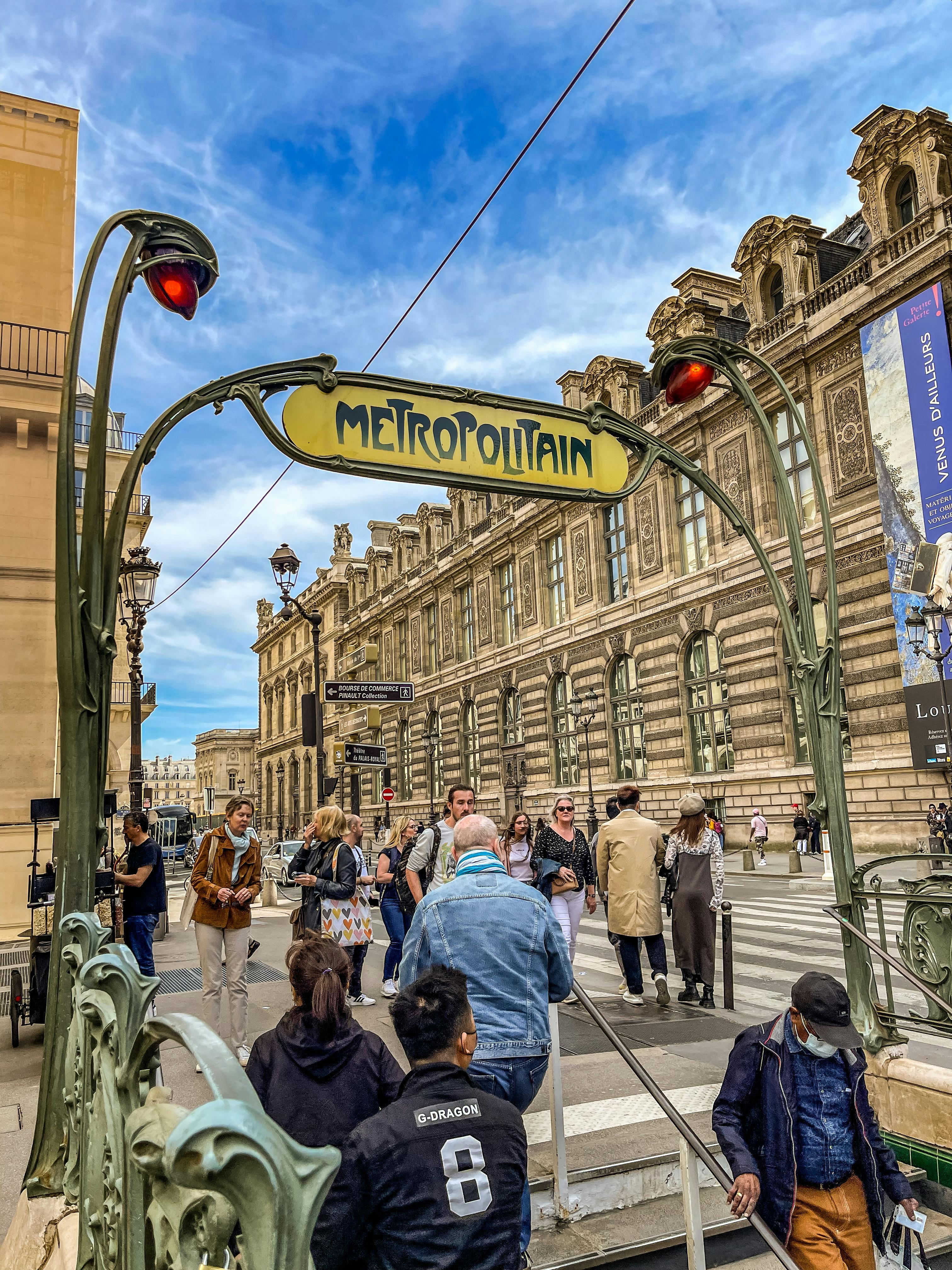 Iconic Paris Metro Entrance with Classic Architecture · Free Stock Photo