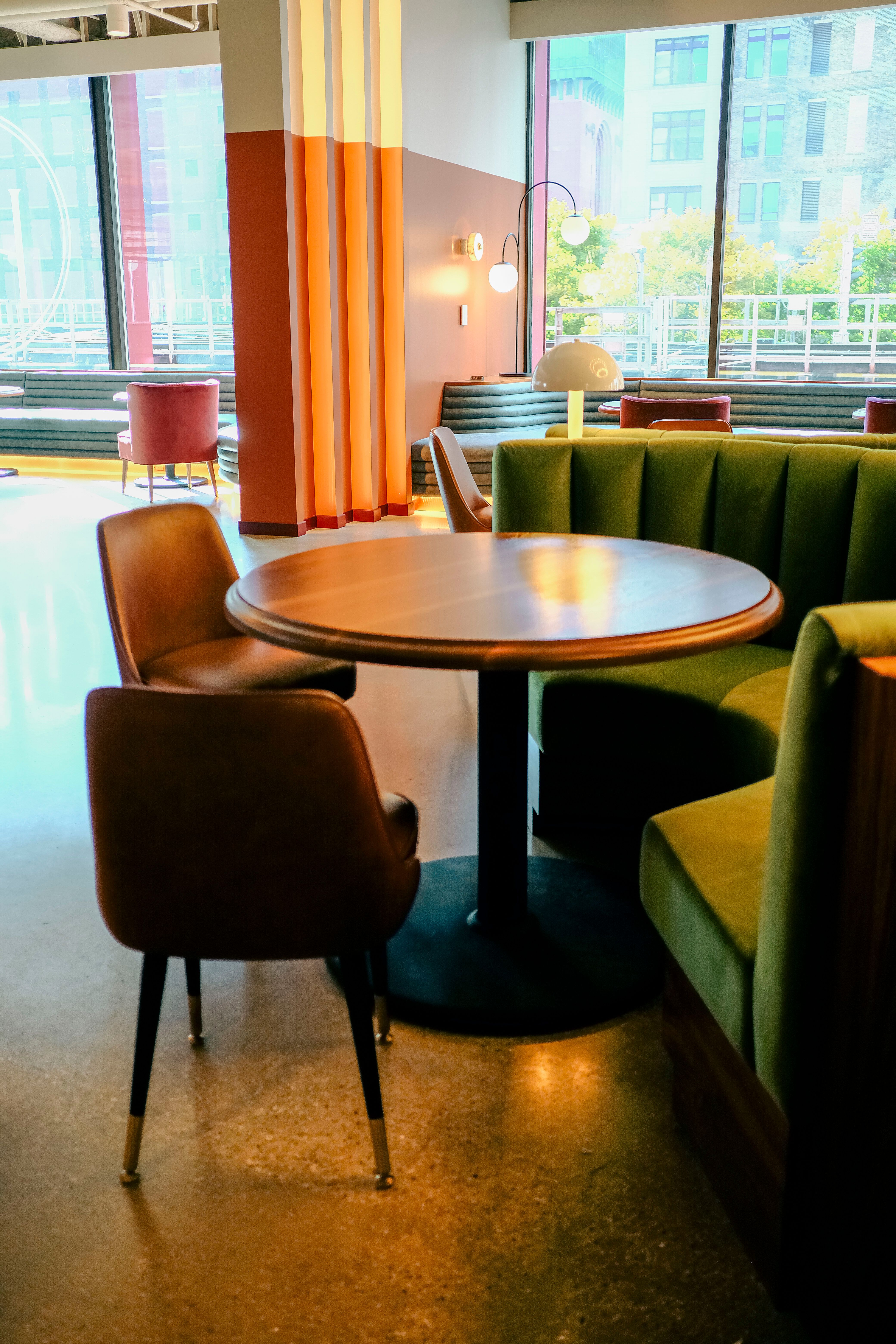 Cozy Modern Café Interior with Seating Area · Free Stock Photo