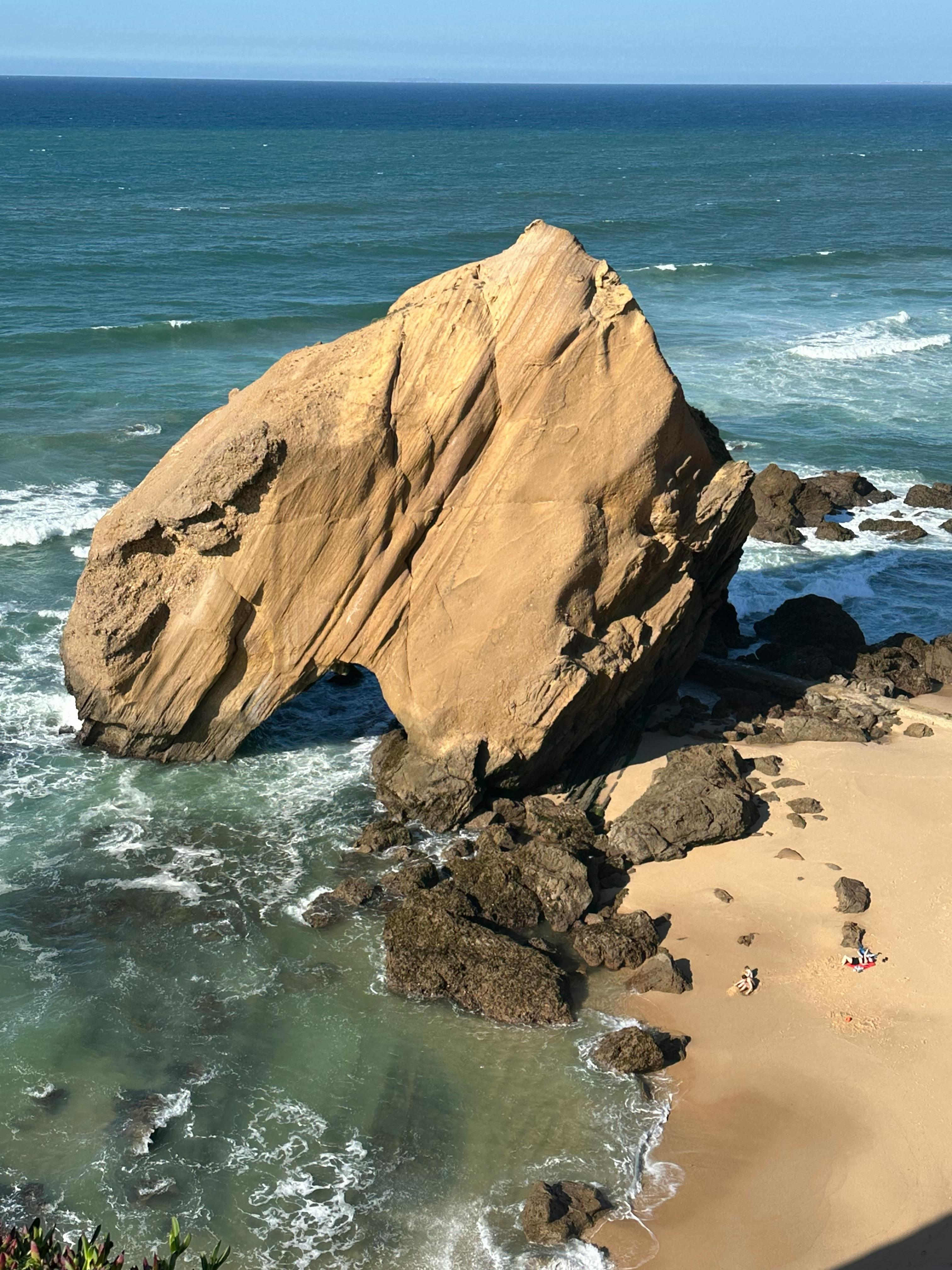 Dramatic Coastal Rock Formation at Praia da Santa Cruz · Free Stock Photo
