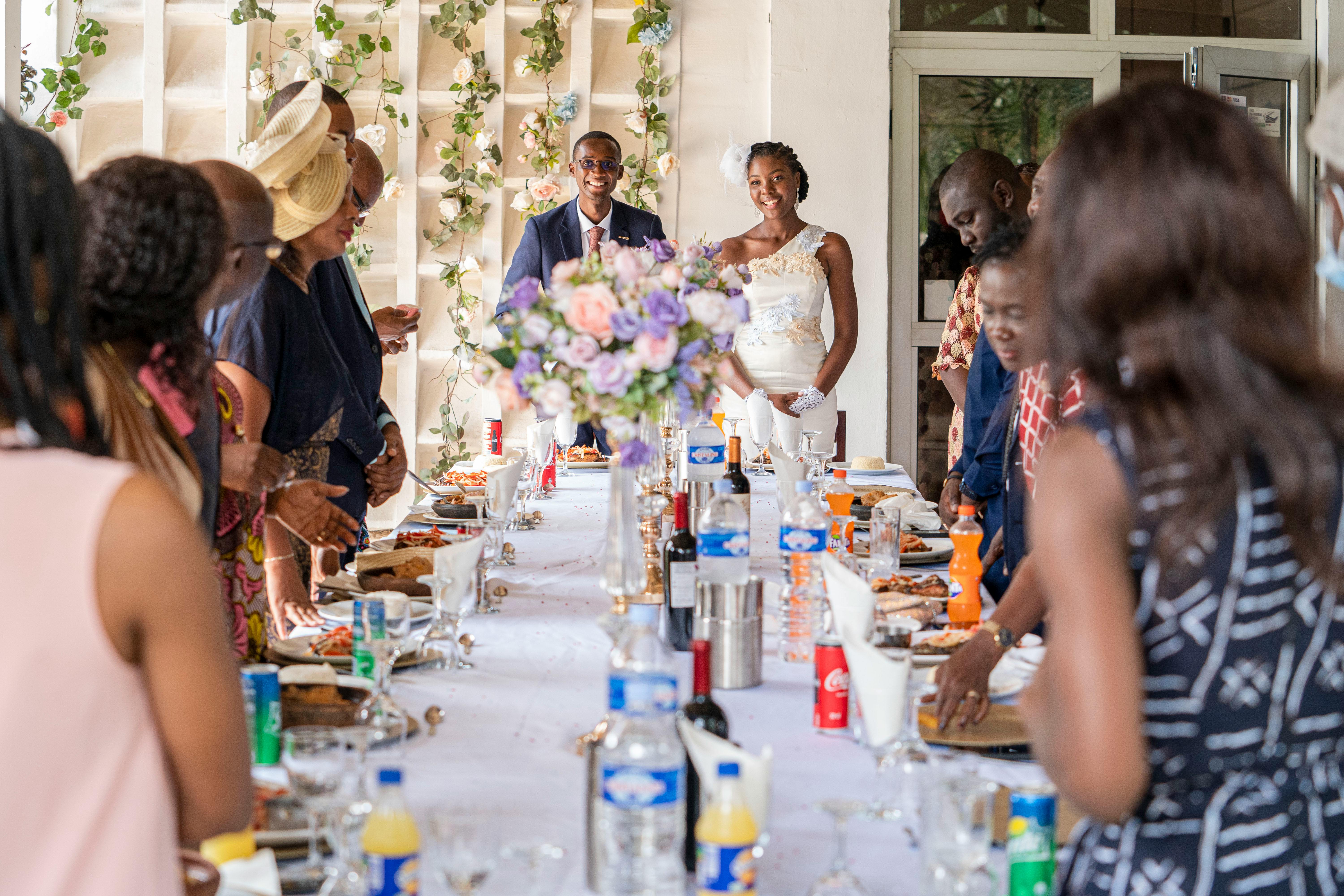 Elegant Wedding Reception with Smiling Couple · Free Stock Photo