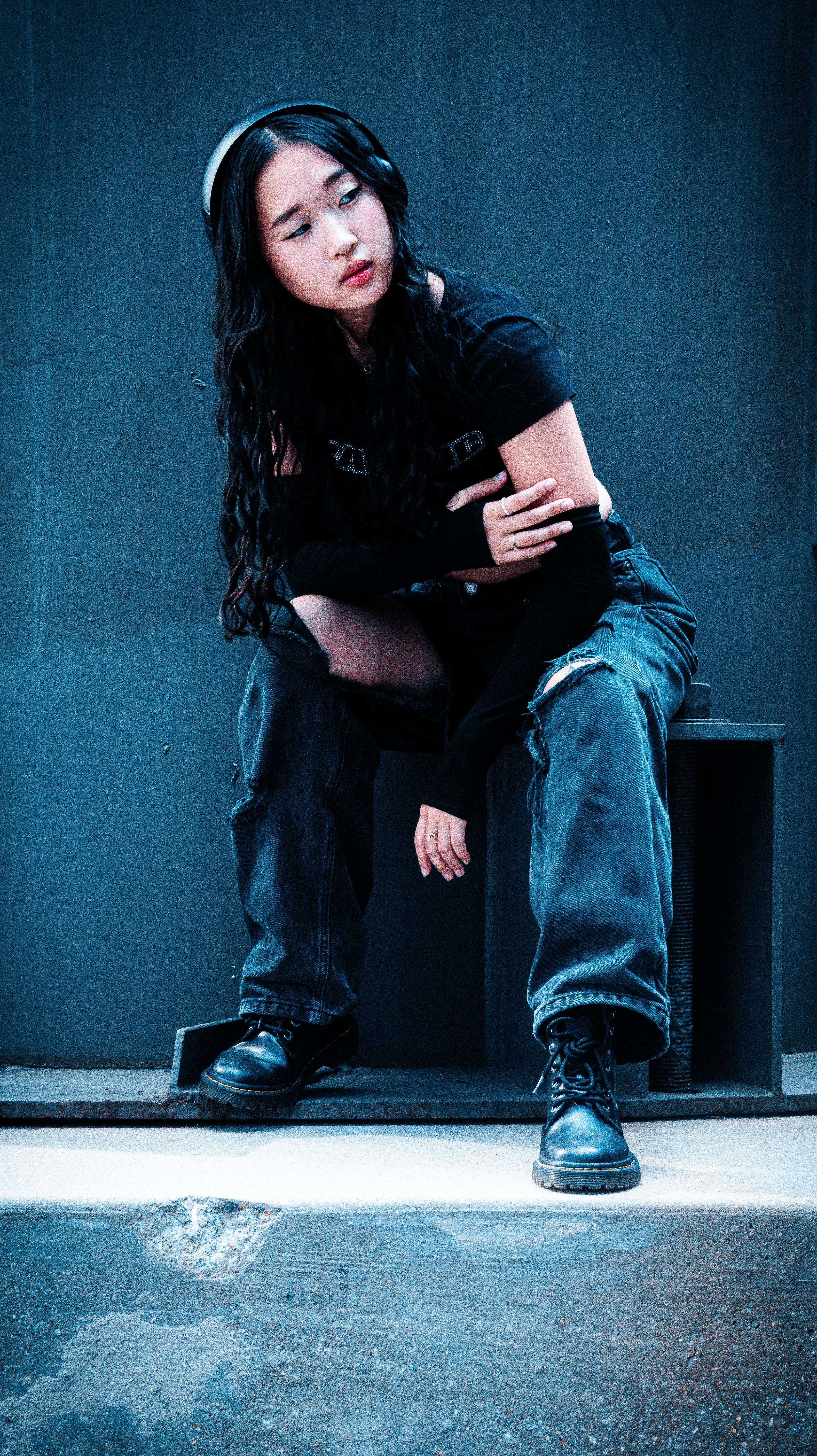 Stylish Woman in Modern Streetwear Pose · Free Stock Photo