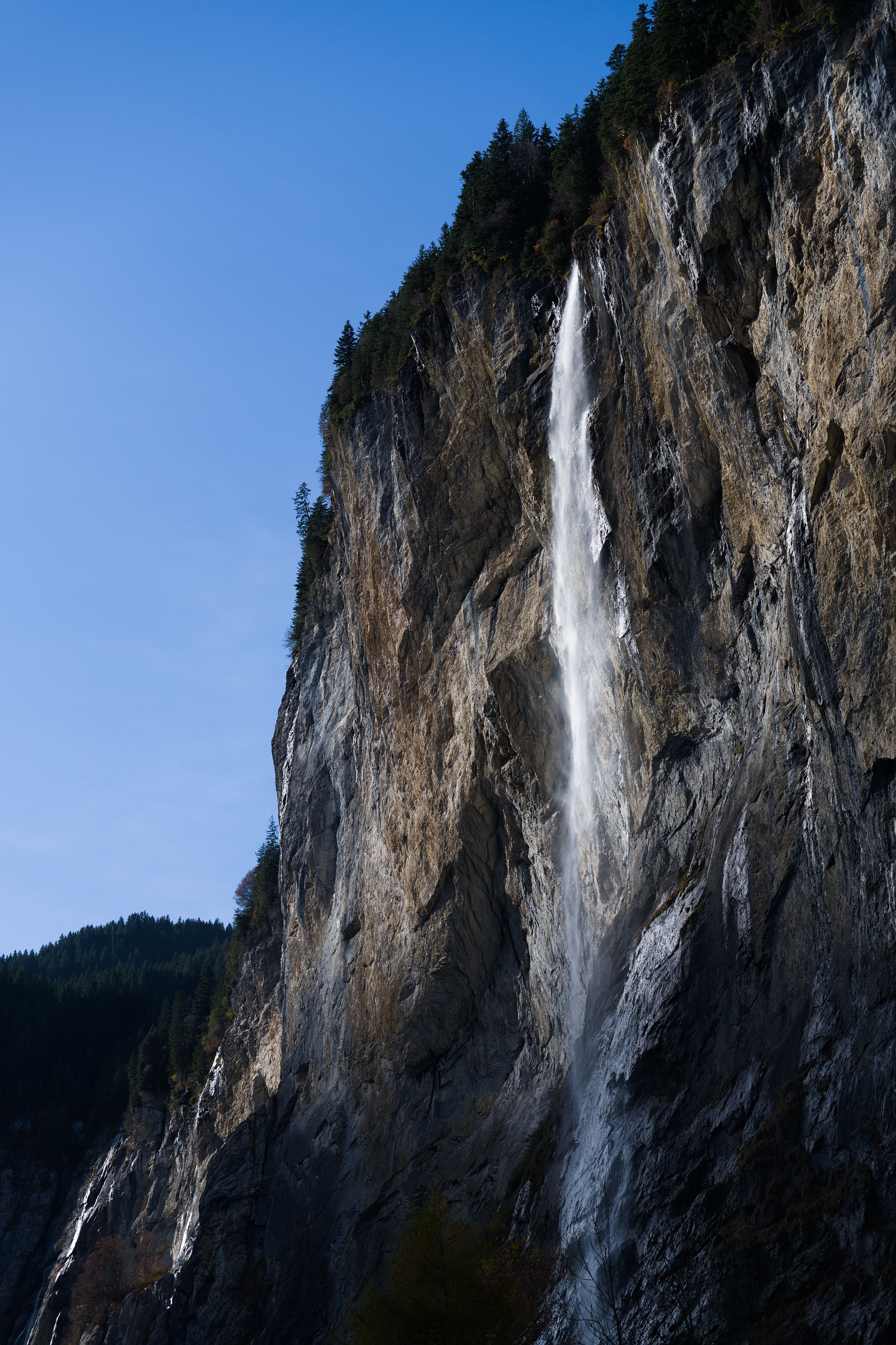 Stunning Waterfall in Swiss Alps Landscape · Free Stock Photo