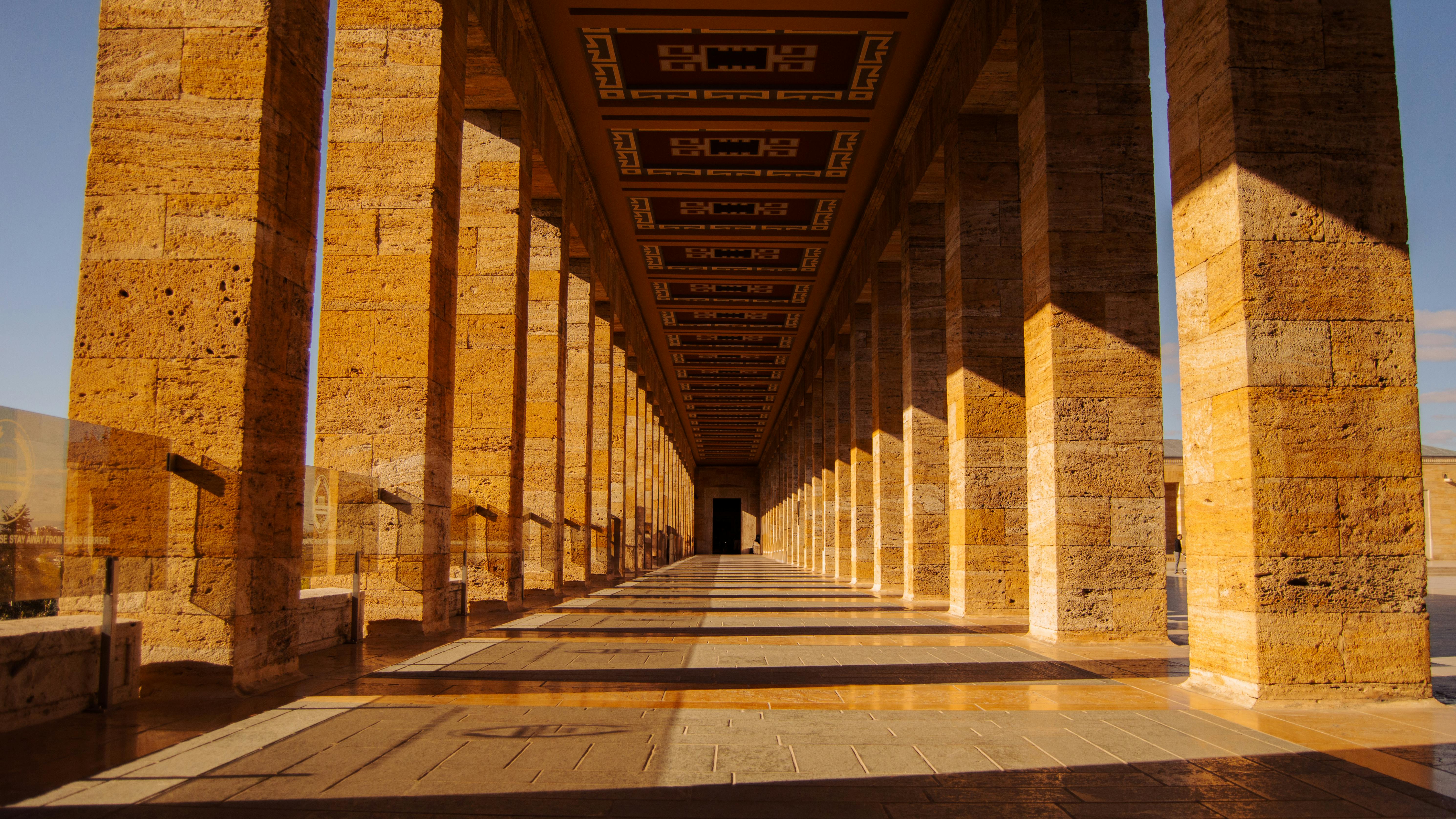 Symmetrical Corridor of Historical Monument · Free Stock Photo