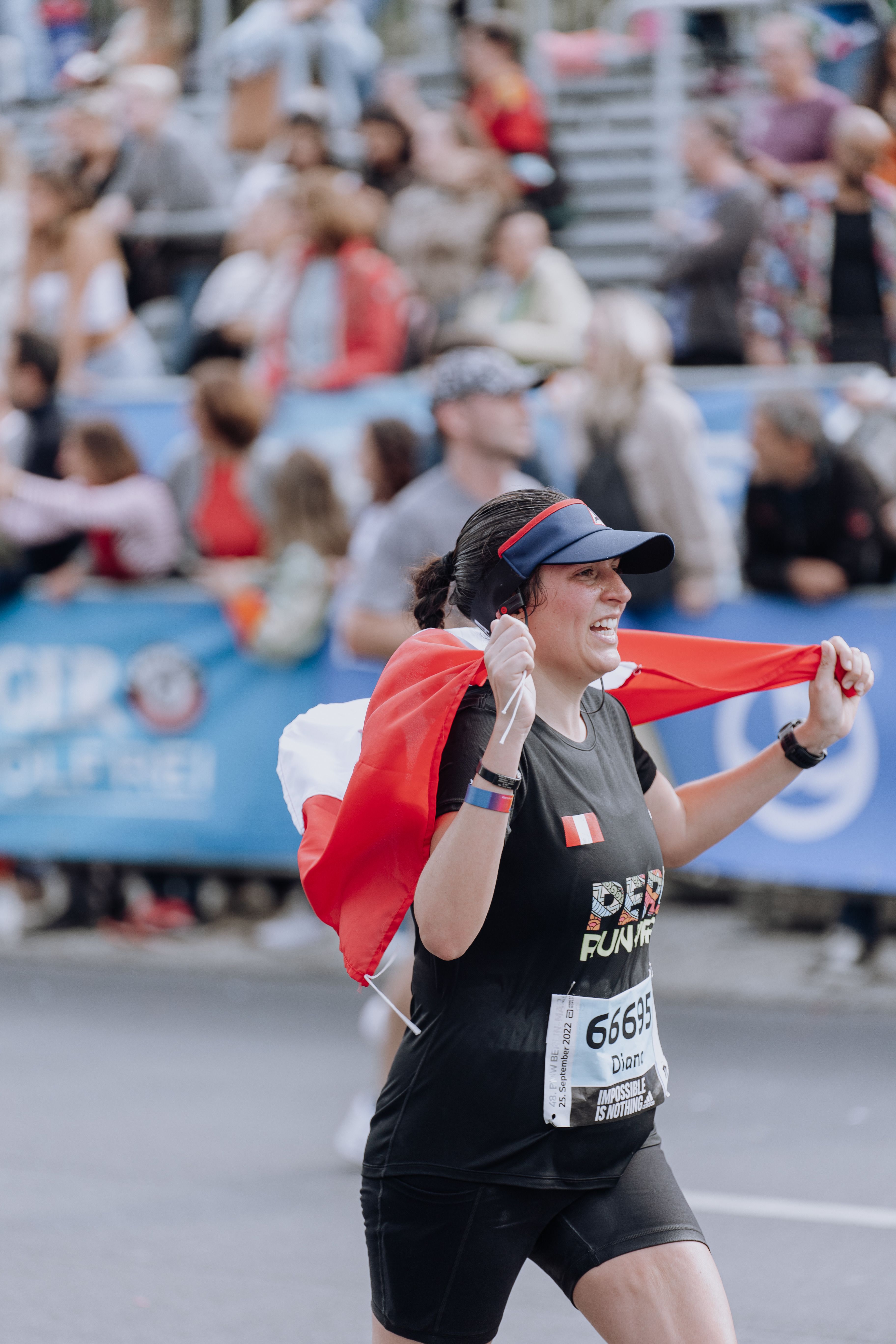 Female Marathon Runner with National Flag Joyfully Finishing · Free ...