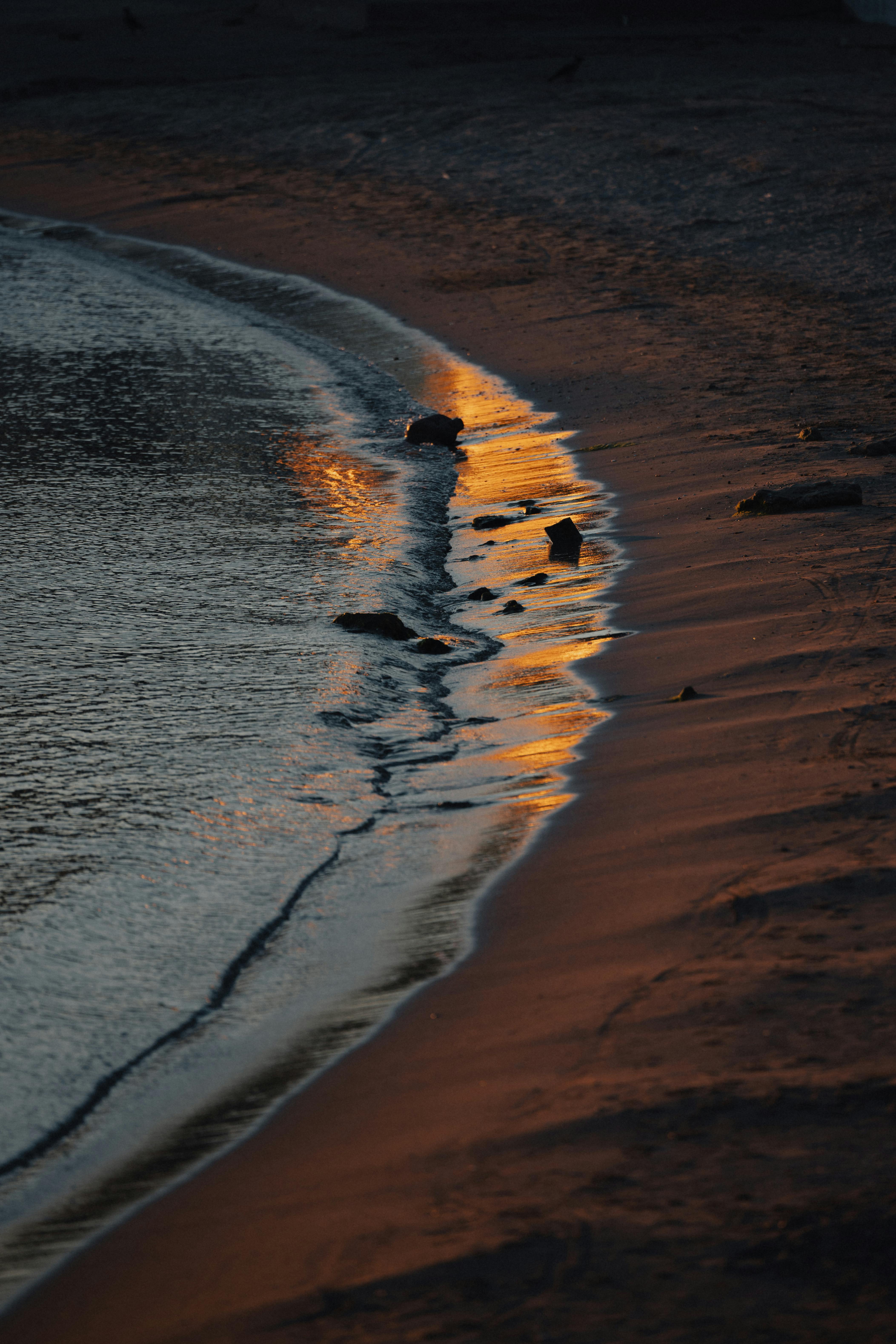 Sunset Reflections on Istanbul Beach · Free Stock Photo