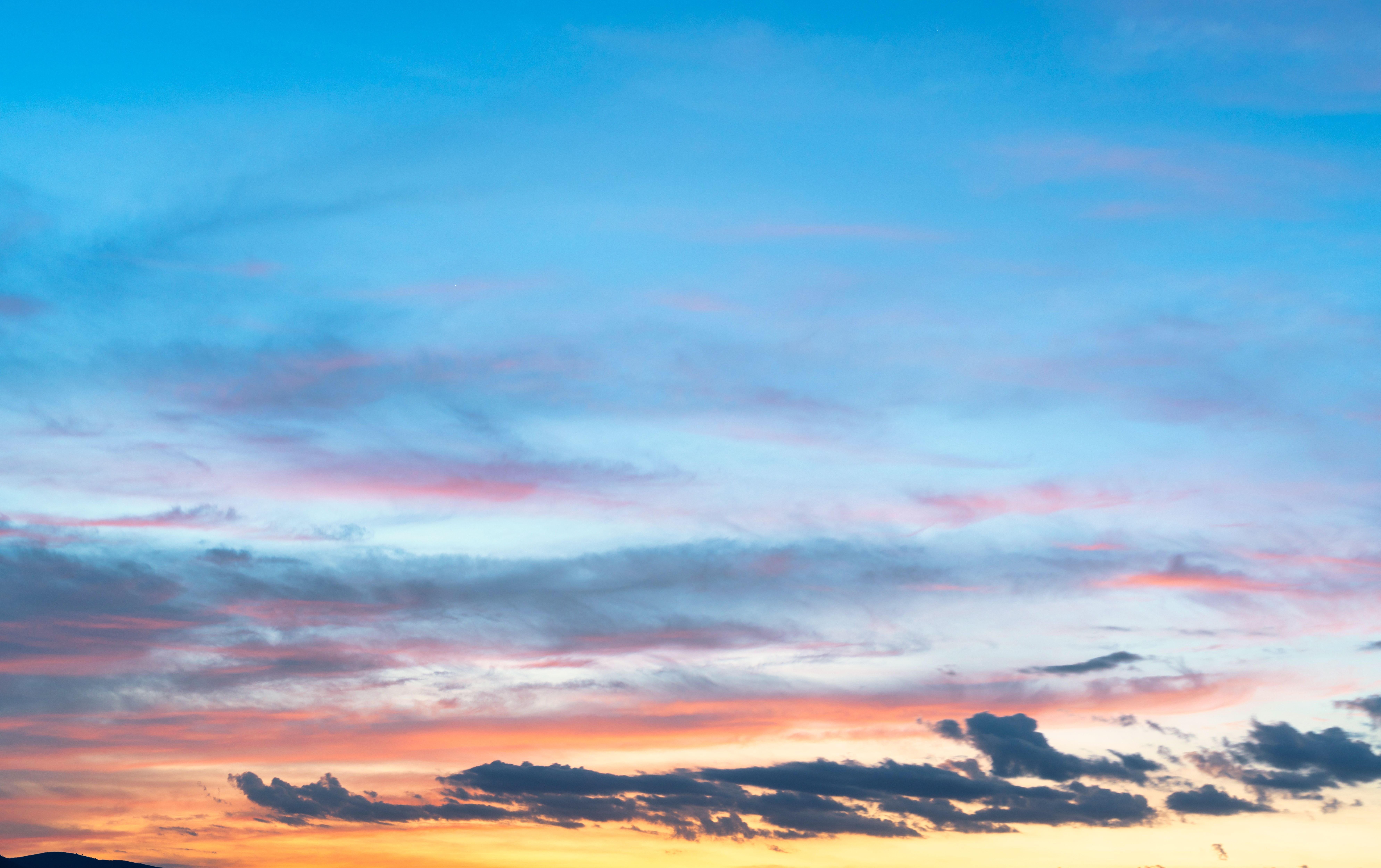 Vibrant Sunset Sky with Dramatic Clouds · Free Stock Photo