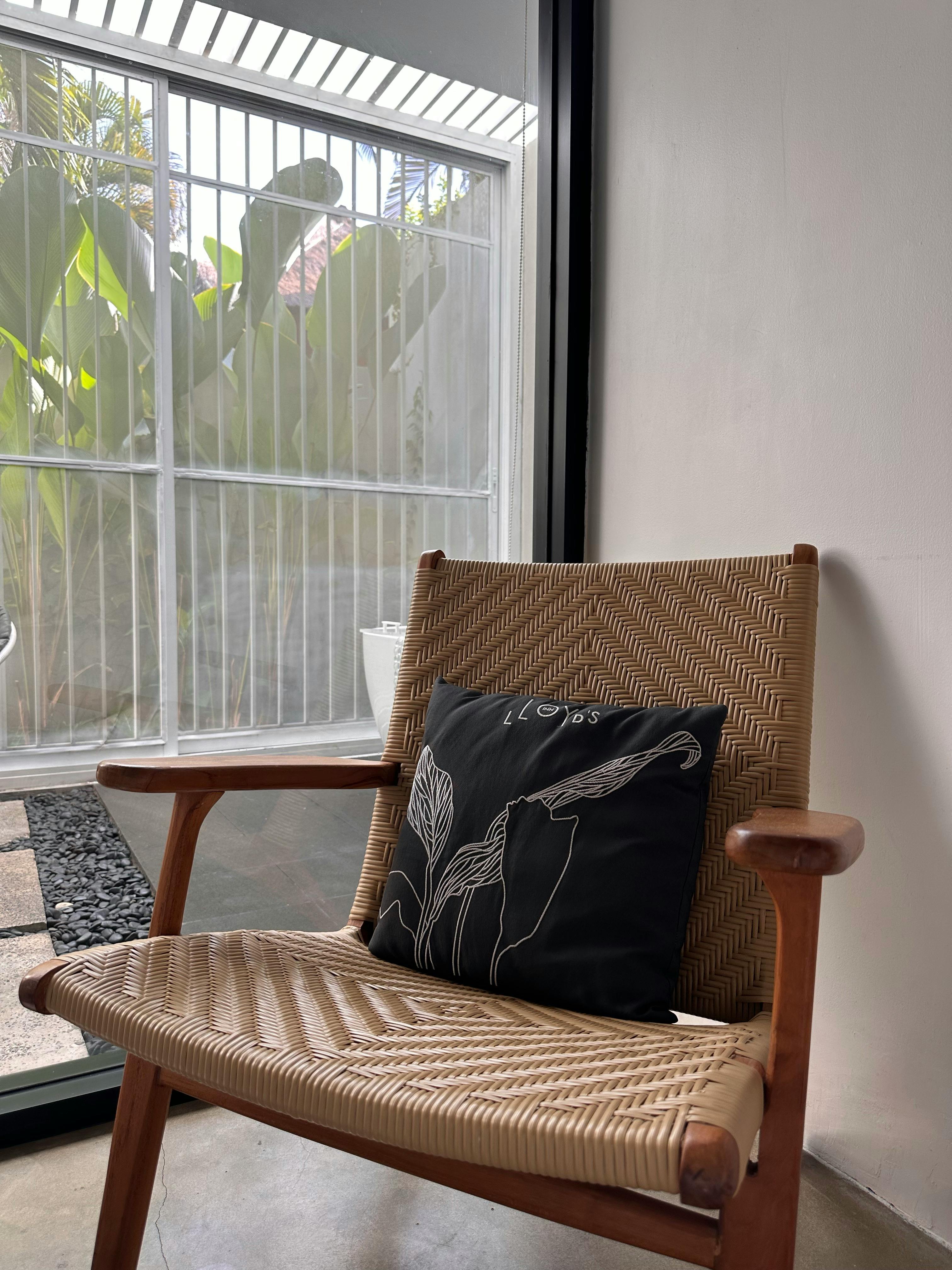 Cozy Rattan Chair in Modern Balinese Interior · Free Stock Photo