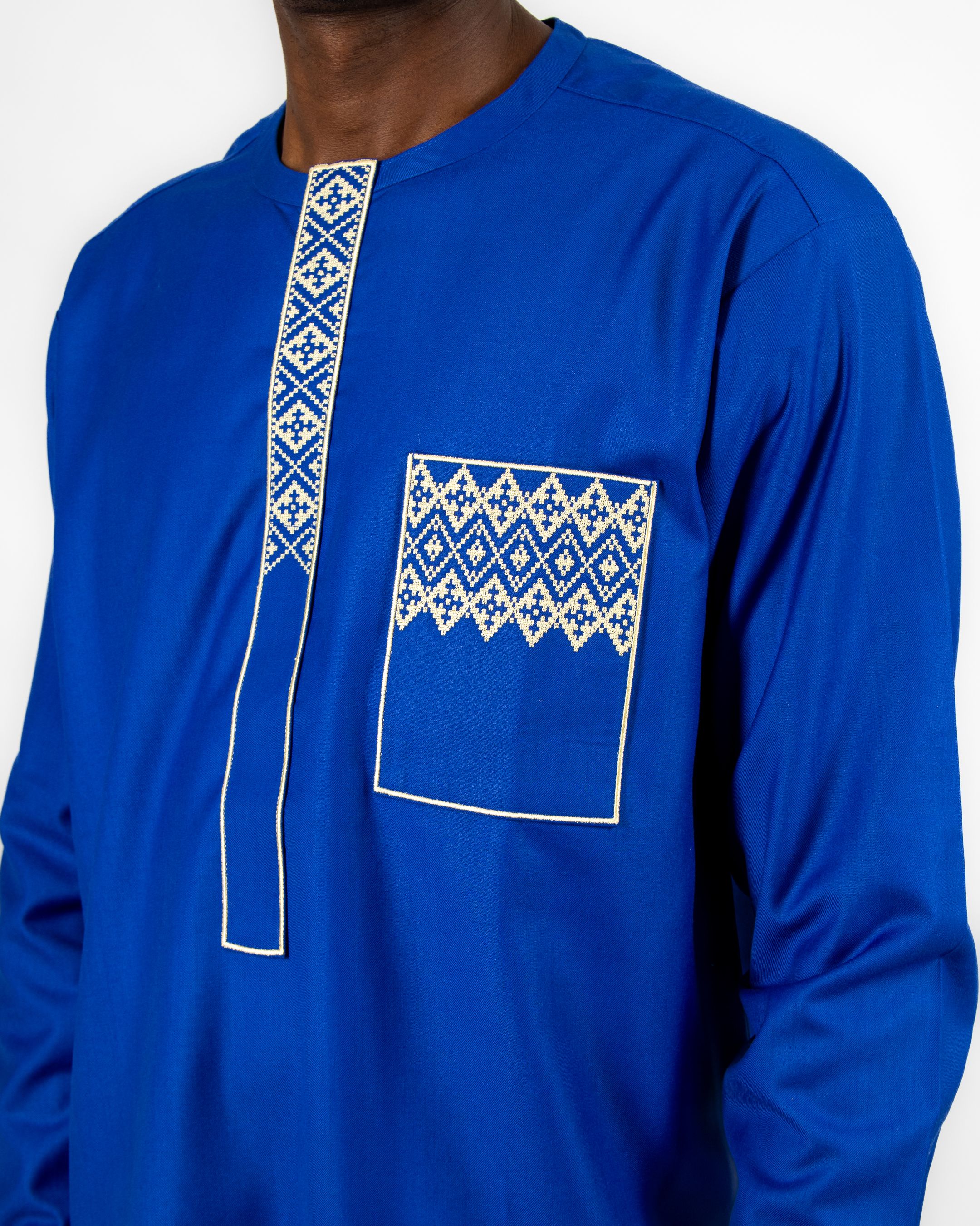 Elegant Blue African Garment with Embroidered Detail · Free Stock Photo