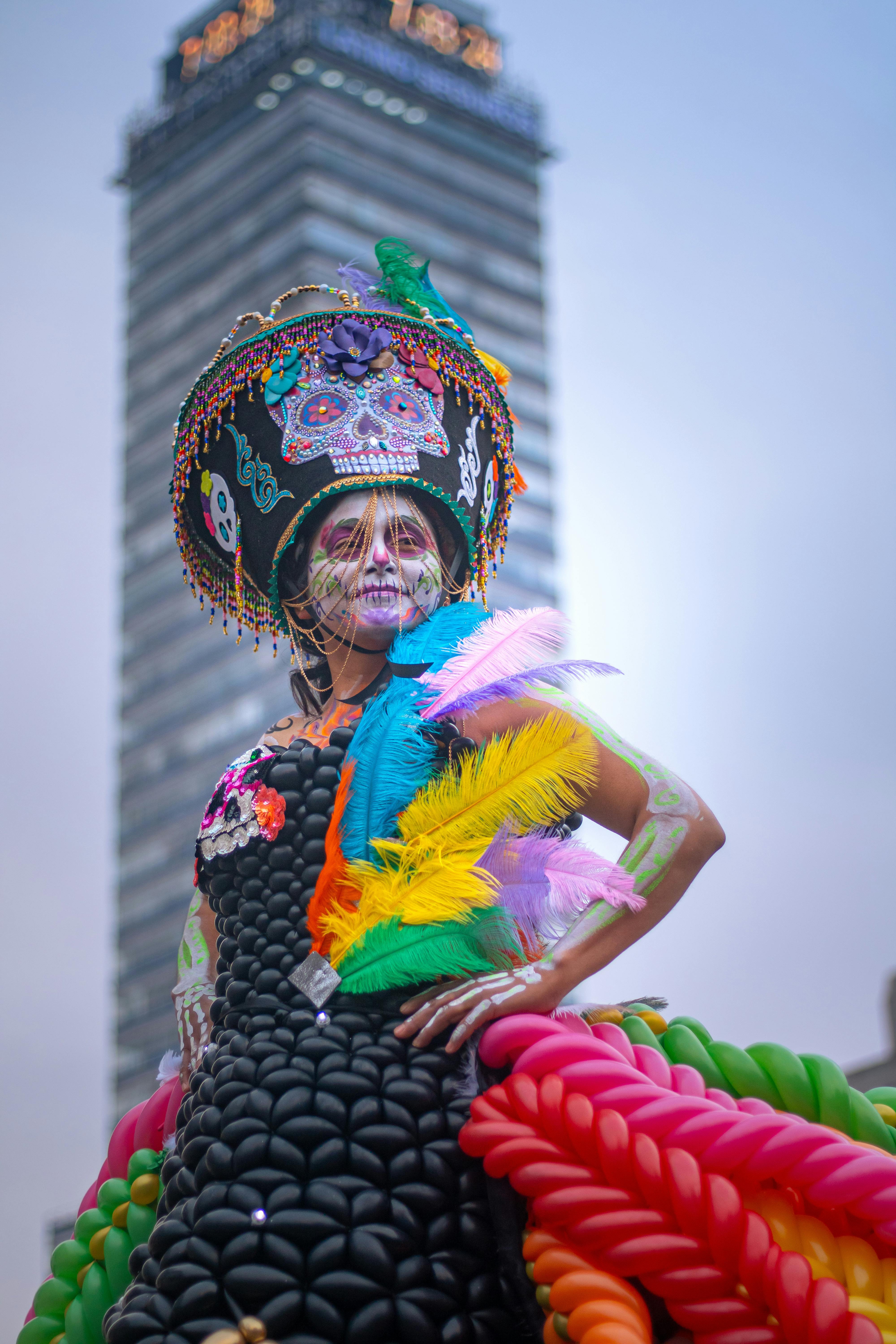 Colorful Catrina with Skyscraper Backdrop in Mexico City · Free Stock Photo